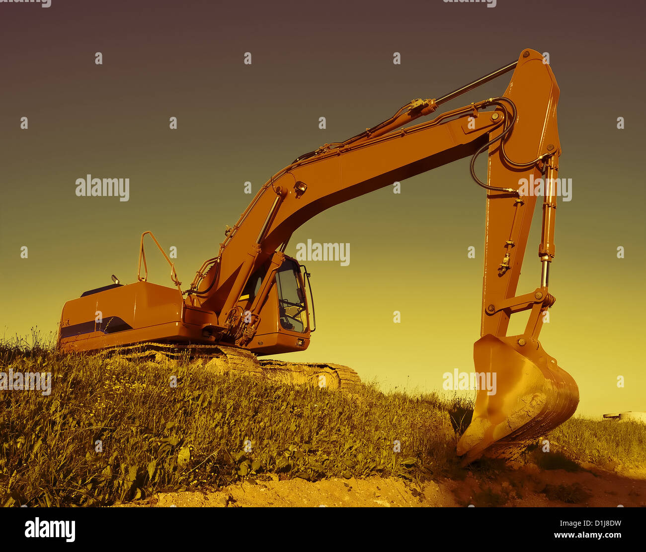 Vintage stylized old photo with a large orange excavator Stock Photo ...