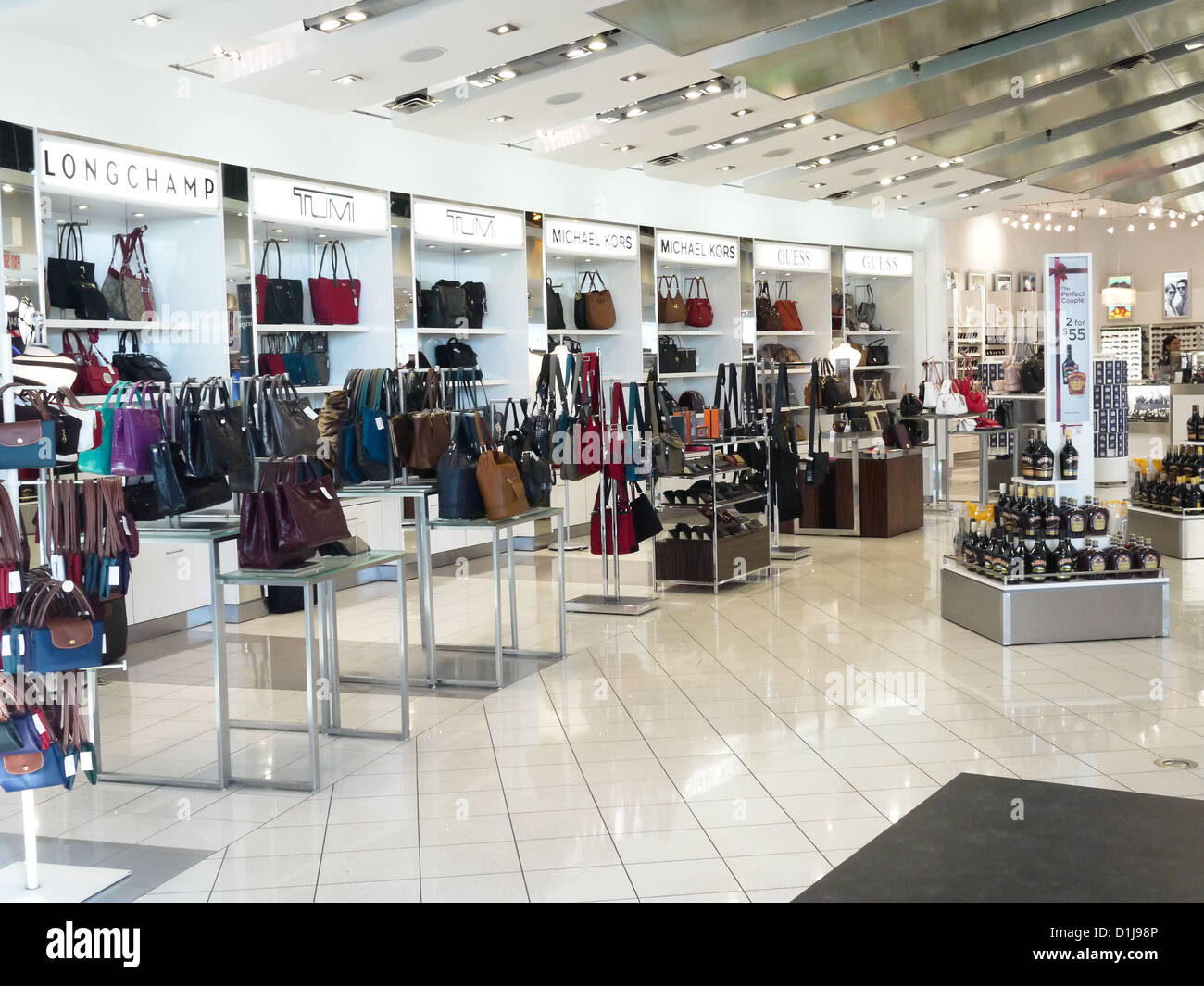 inside retail luxury handbag shop toronto airport Stock Photo - Alamy
