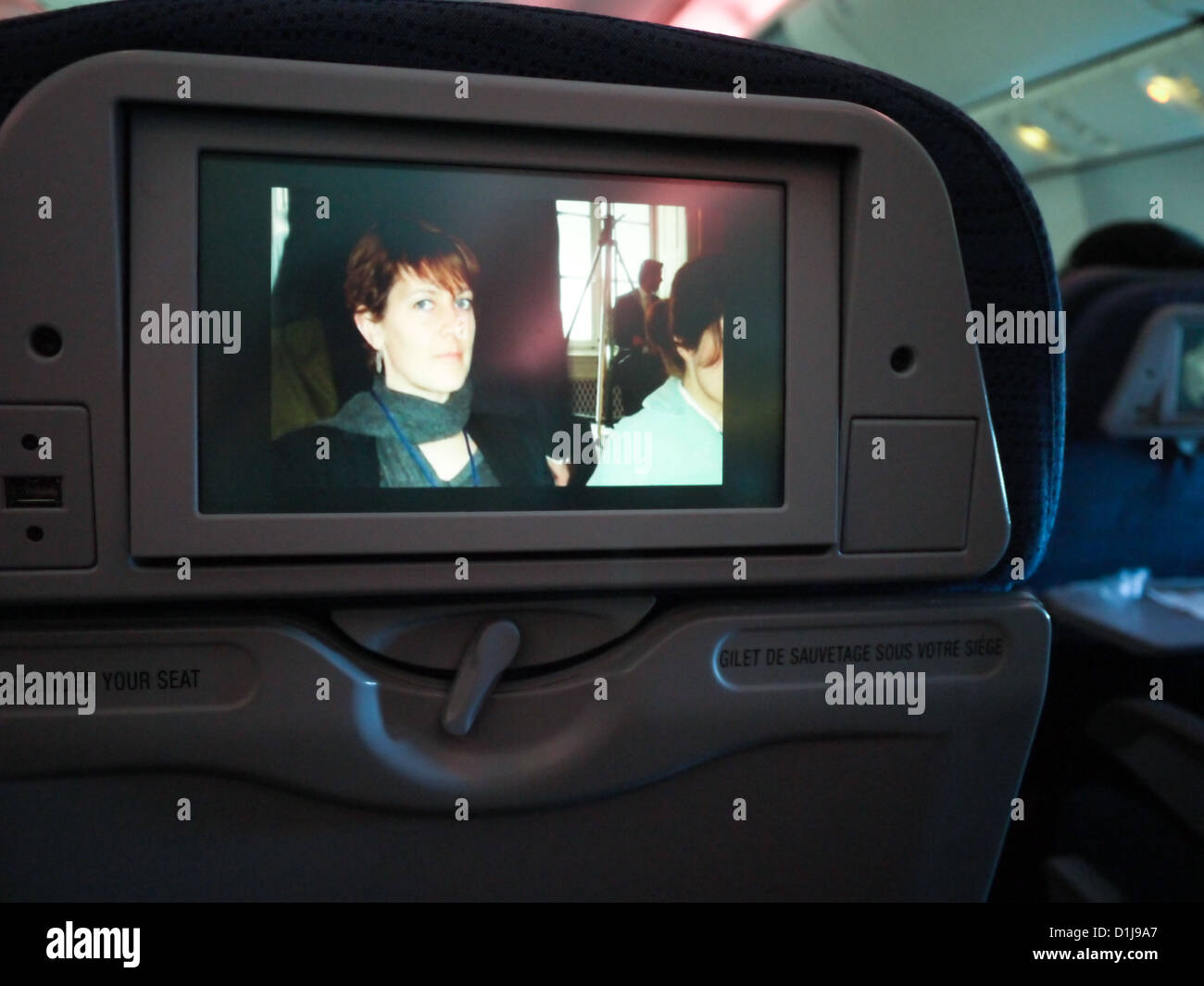 screen airplane cabin in-flight entertainment Stock Photo - Alamy