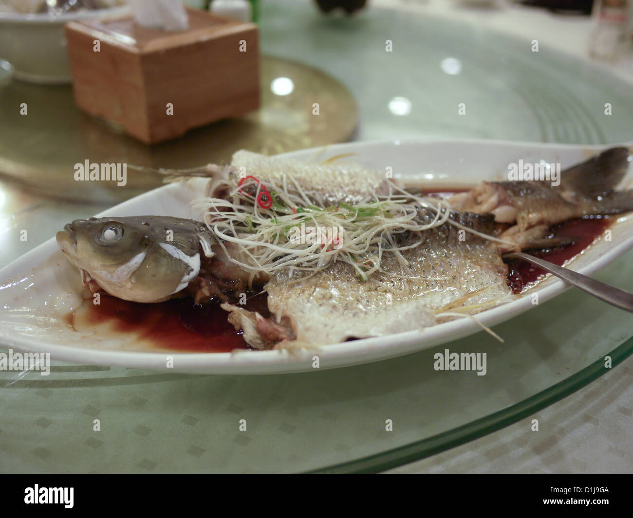 steamed fish soya source green onion dish Stock Photo - Alamy