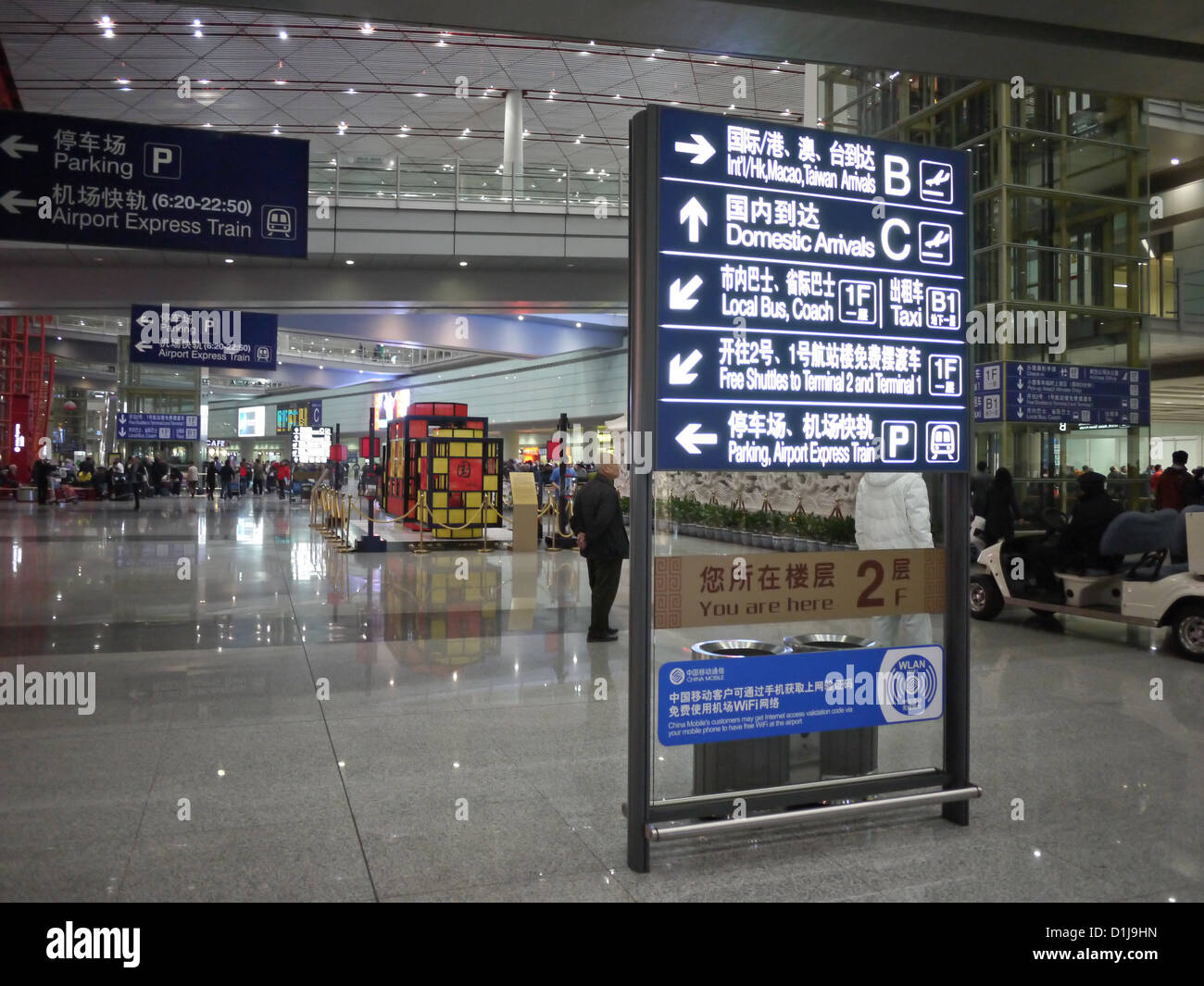 chinese sign direction inside asian airport asia Stock Photo - Alamy