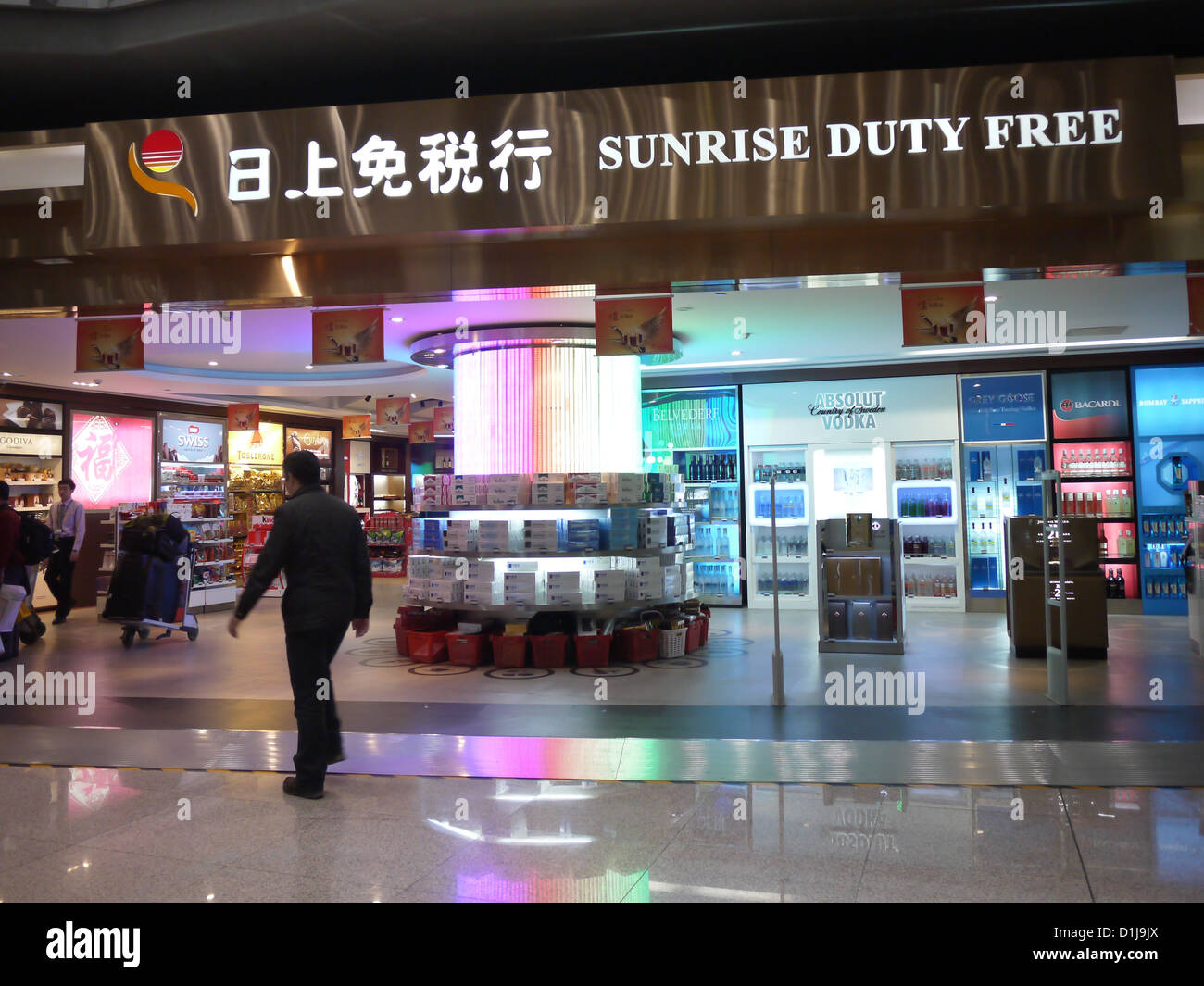 Duty free shop inside beijing airport hi-res stock photography and ...