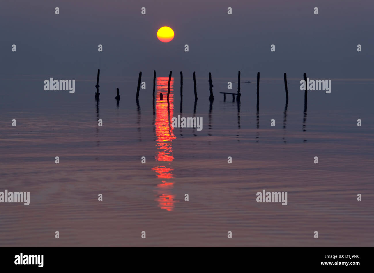The Wash with incoming tide at sunset Norfolk UK December Stock Photo ...