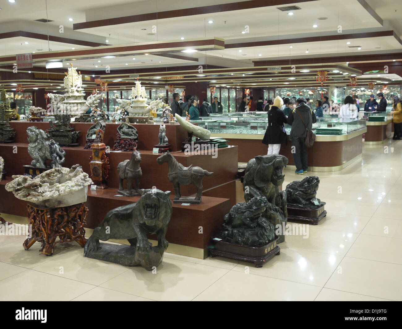 chinese jade craving store inside Stock Photo - Alamy