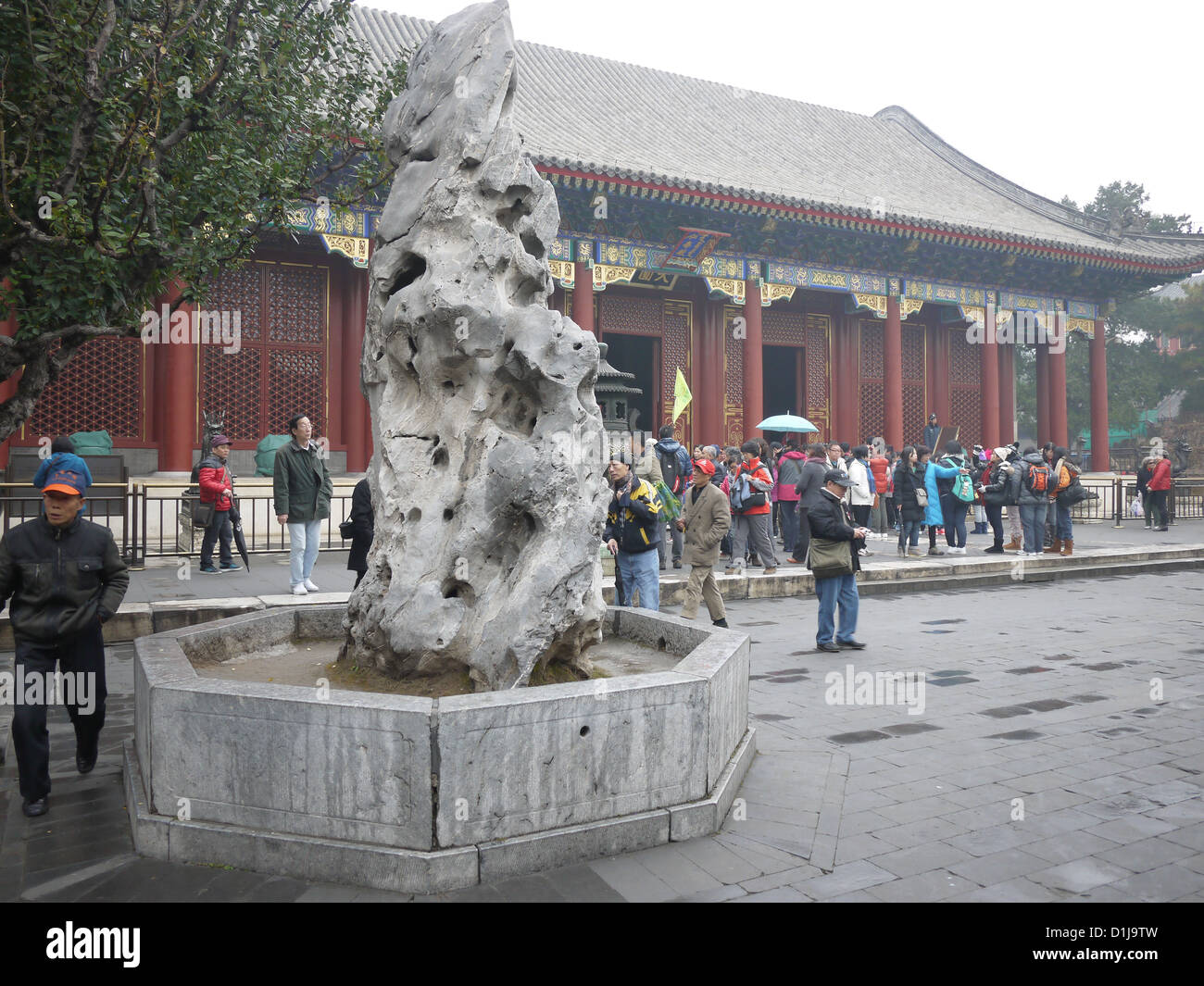 Hall of Benevolence and Longevity rock statue Stock Photo - Alamy