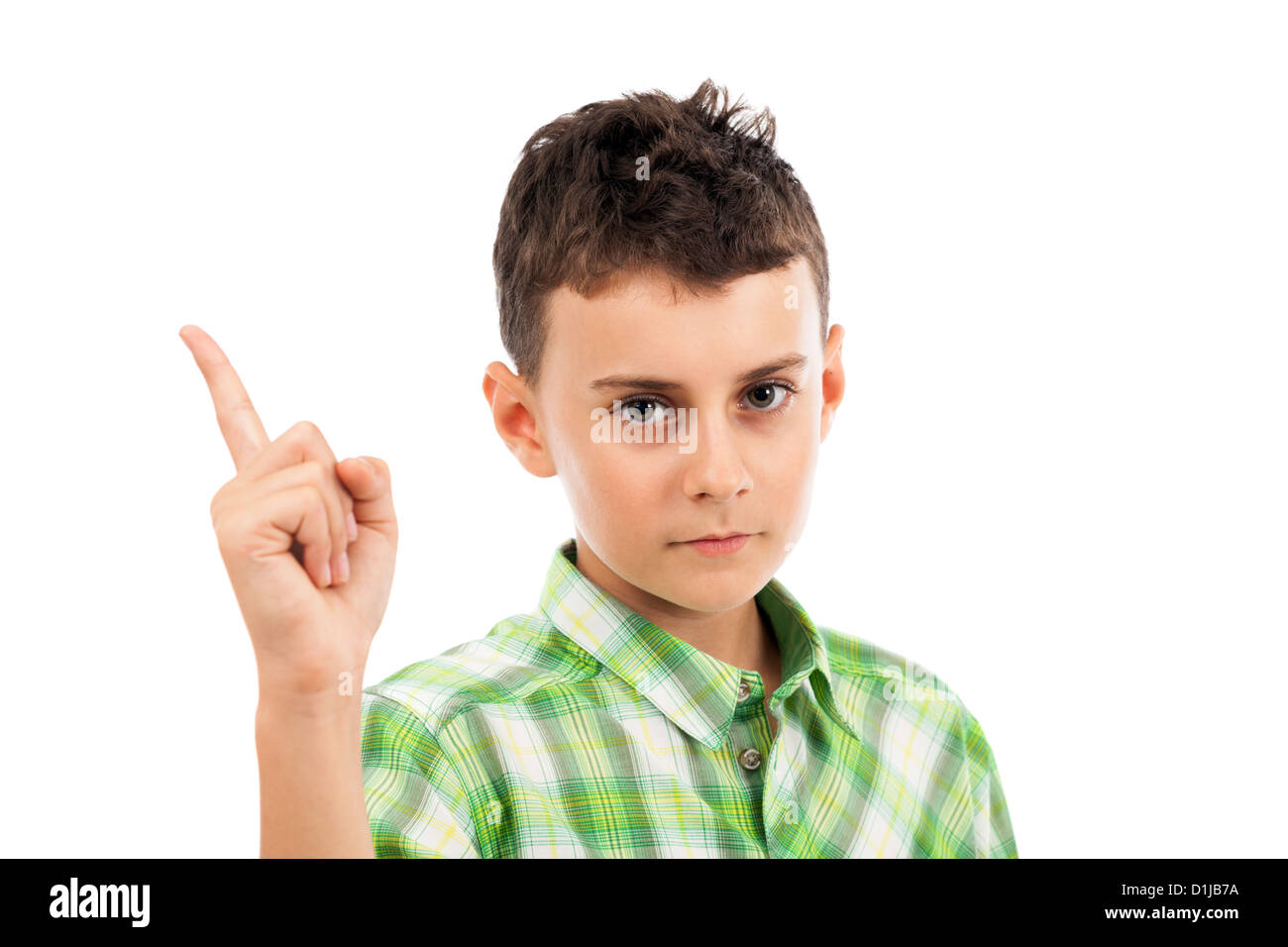 Studio portrait of a schoolboy making warning sign, isolated on white ...