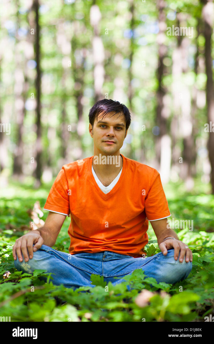 Man sit cross legs hi-res stock photography and images - Alamy