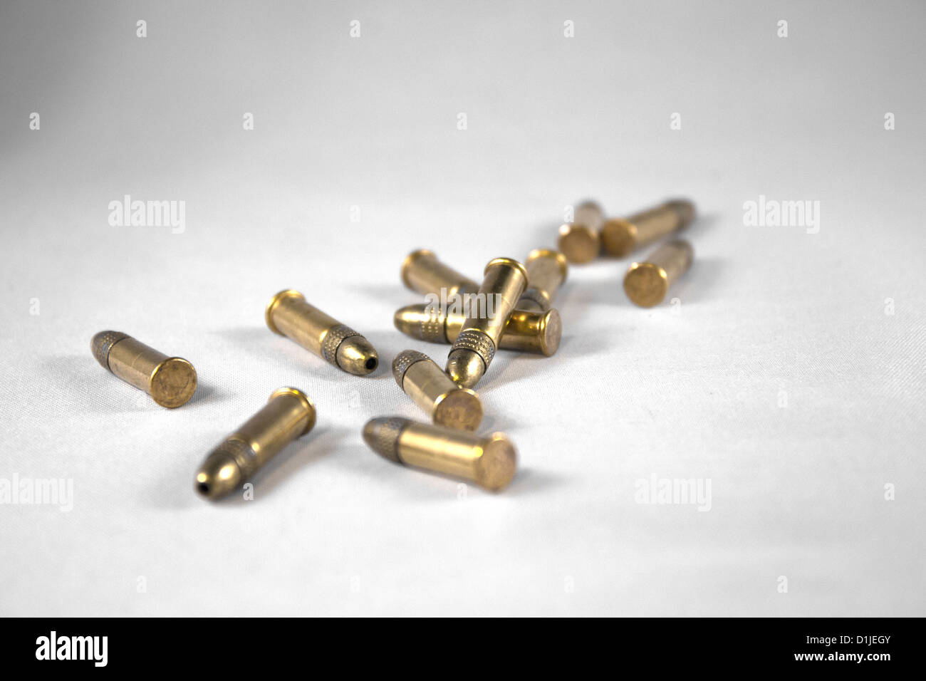a bunch of bullets isolated on white Stock Photo - Alamy