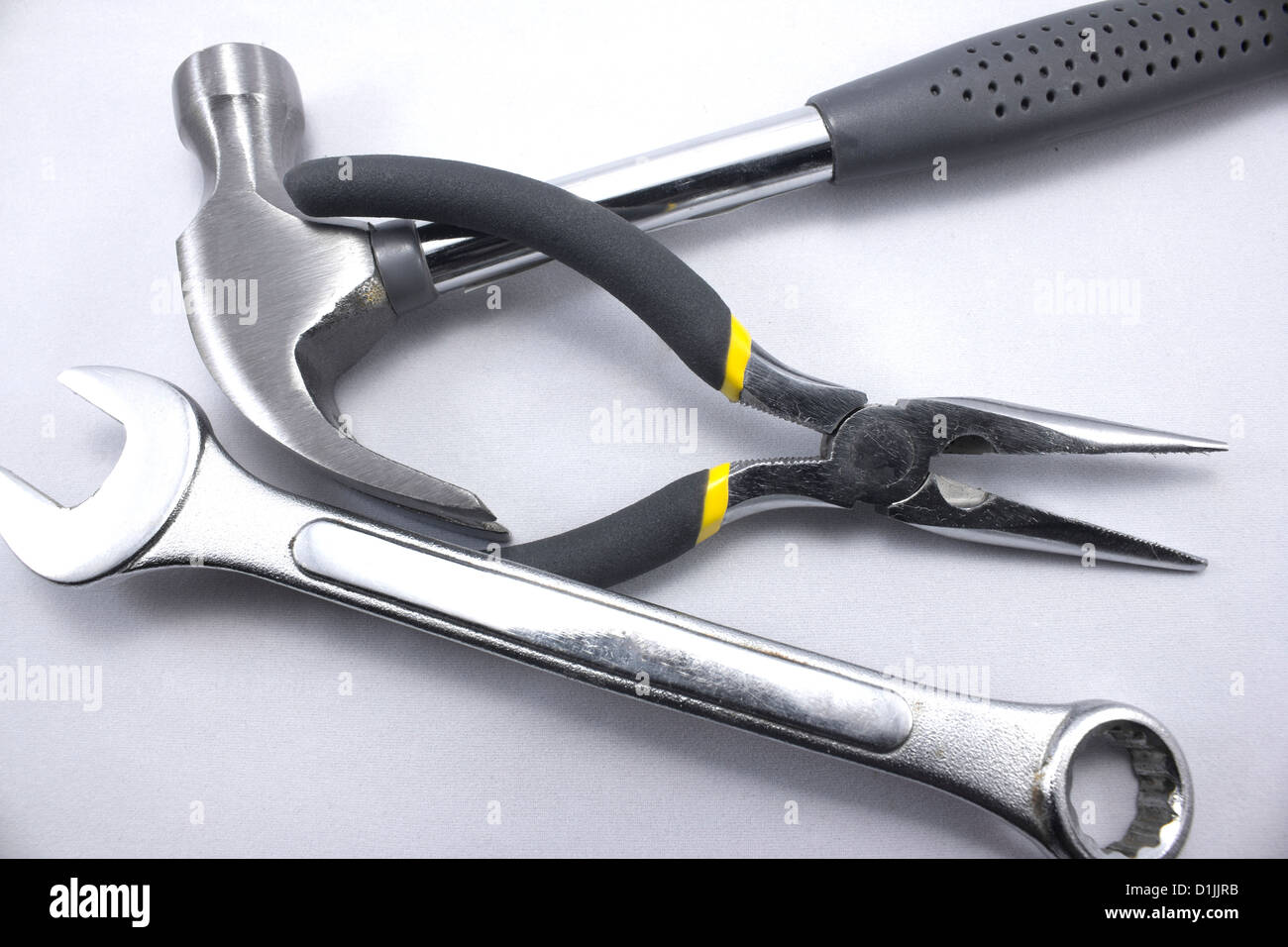 tool pile isolated on a white background Stock Photo - Alamy