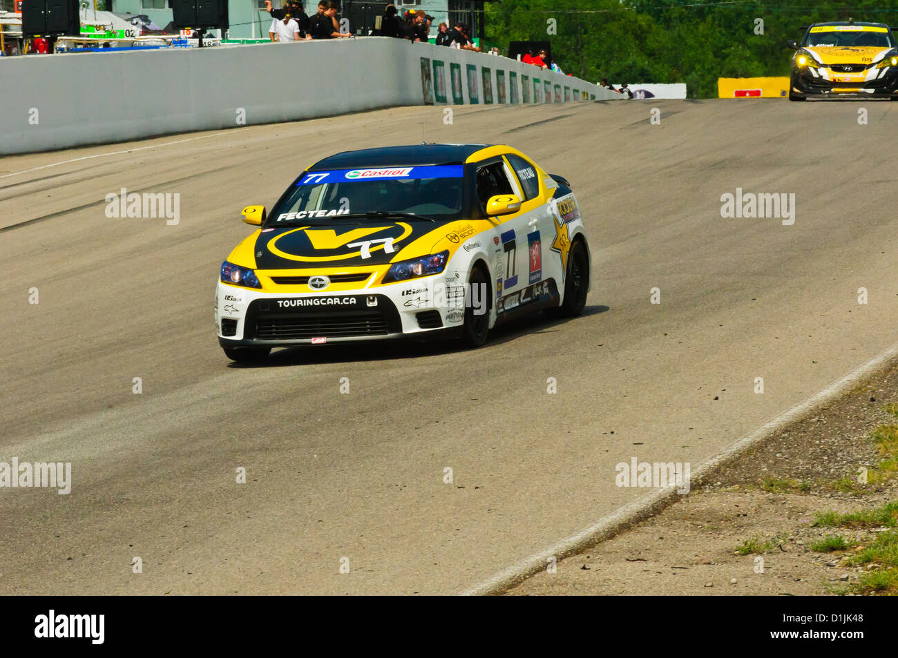 Cars exit turn 1 during the Canadian Touring Car Championship (CTCC ...