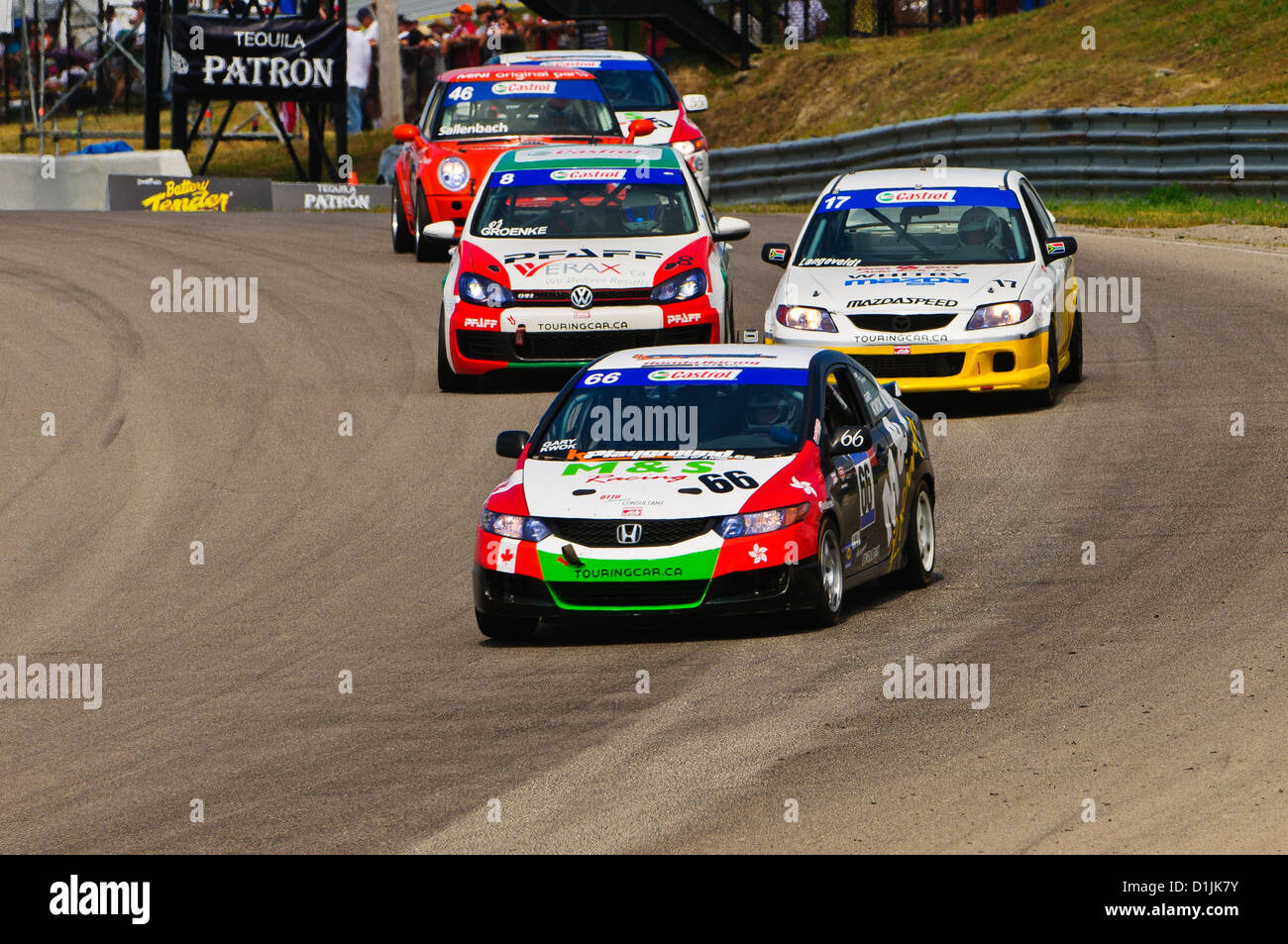 A Honda Civic defends during the Canadian Touring Car Championship ...