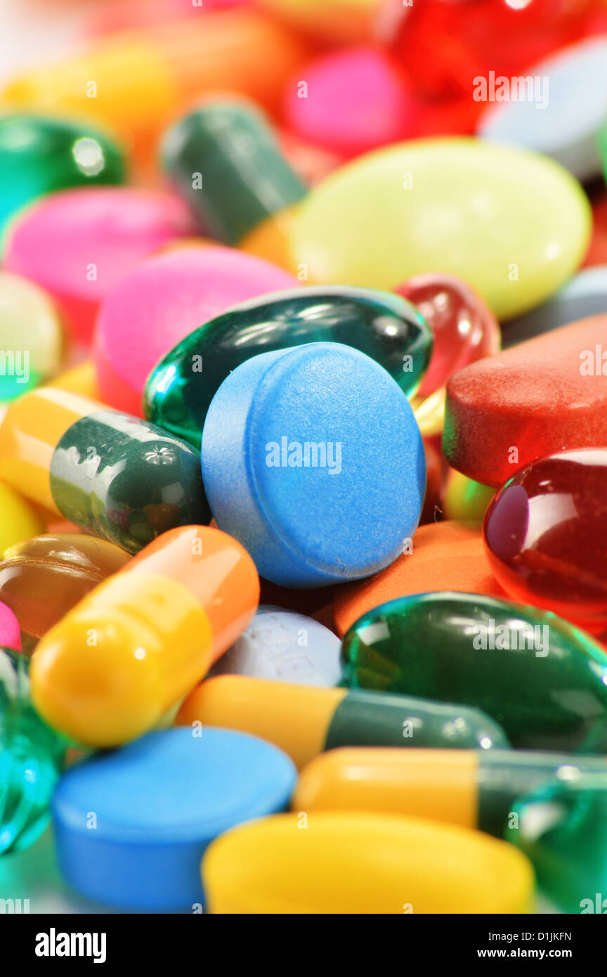 Composition with dietary supplement capsules and drug pills Stock Photo ...