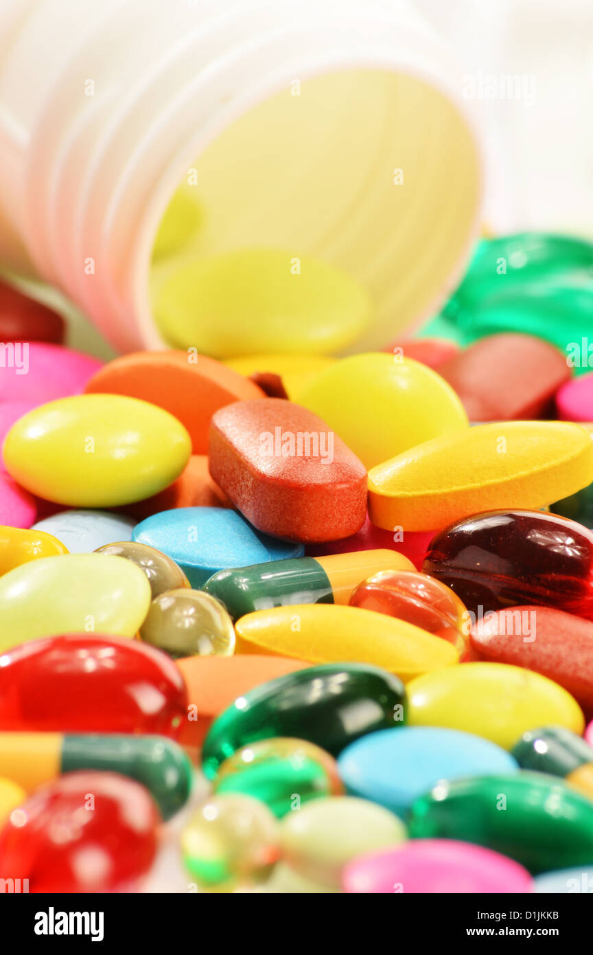 Composition with dietary supplement capsules and drug pills Stock Photo ...