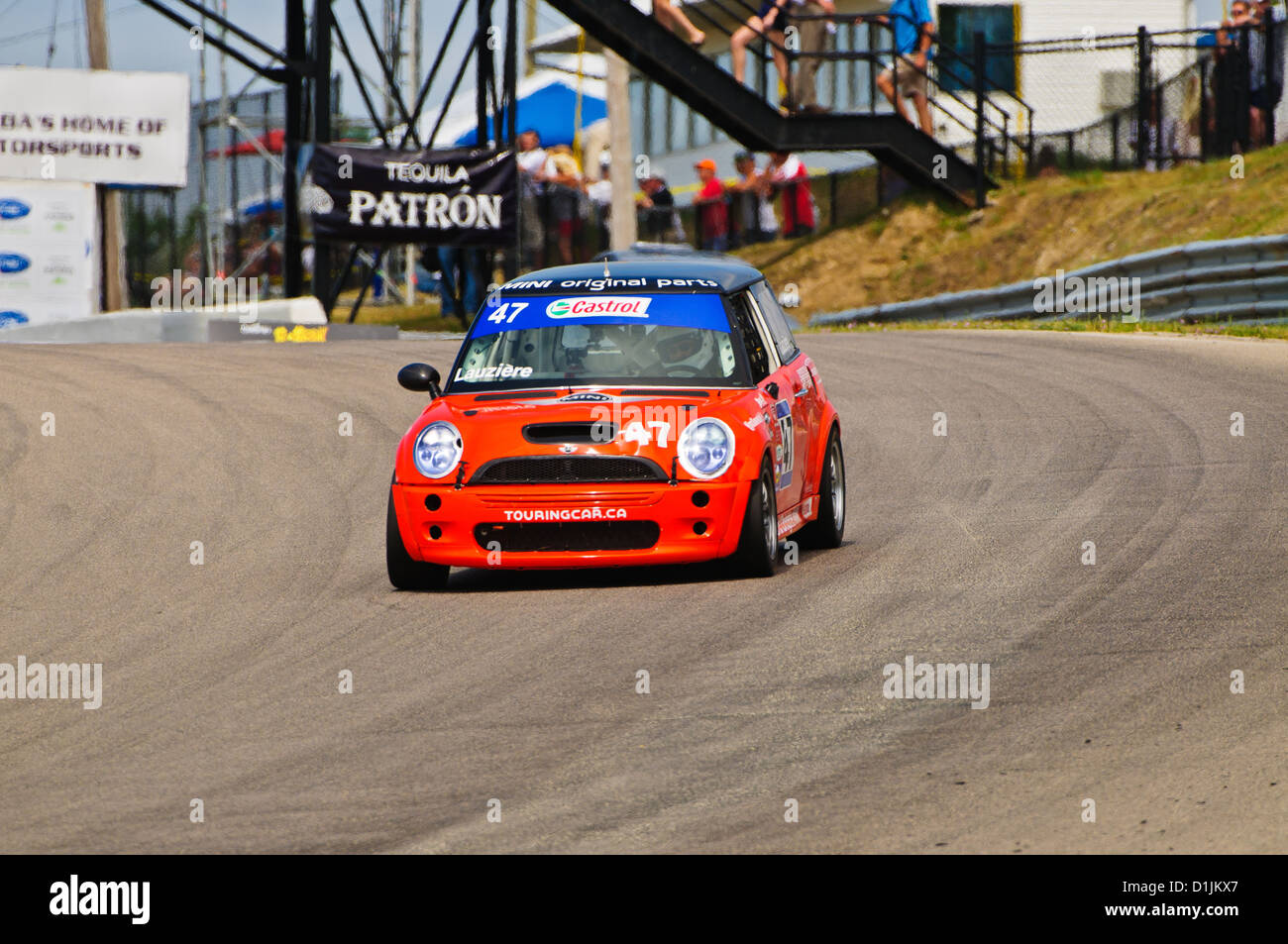 A Mini Cooper competes in the CTCC Canadian Touring Car Championship at ...