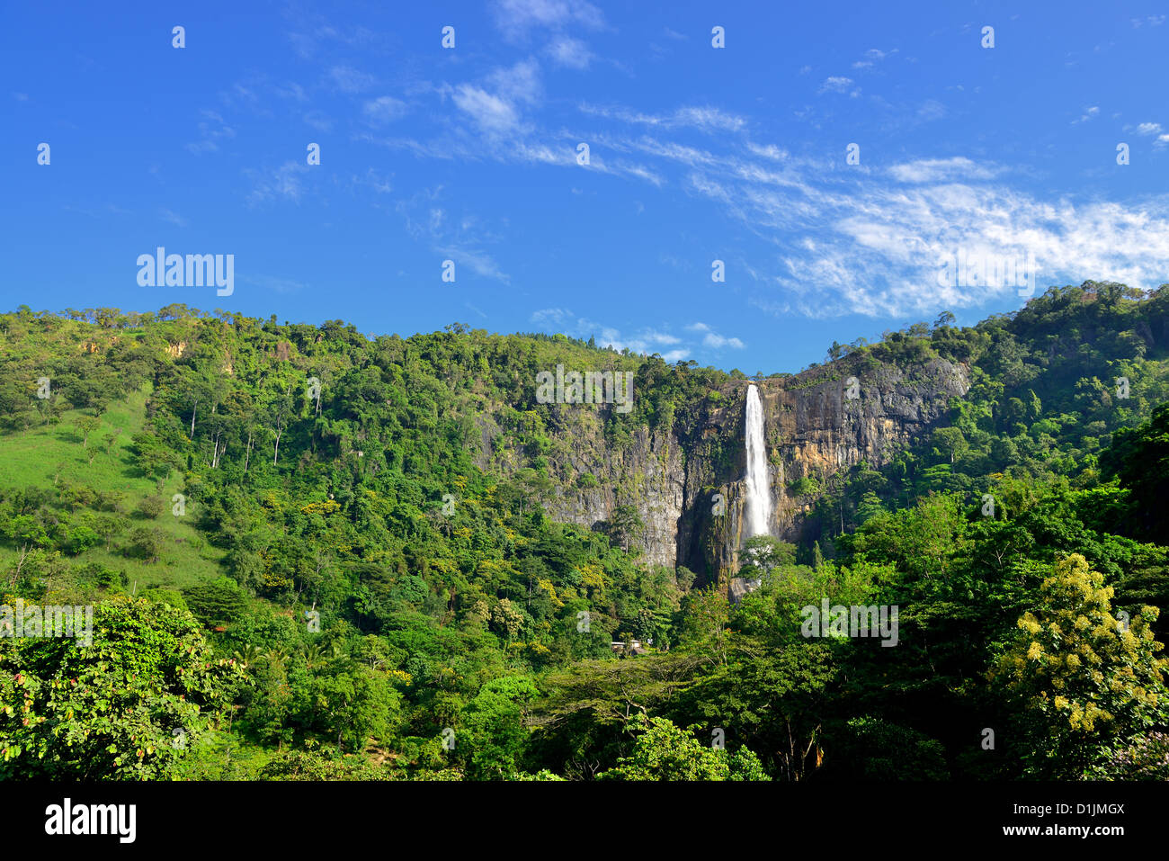The waterfall. The waterfall with the mountains in the country of Sri ...