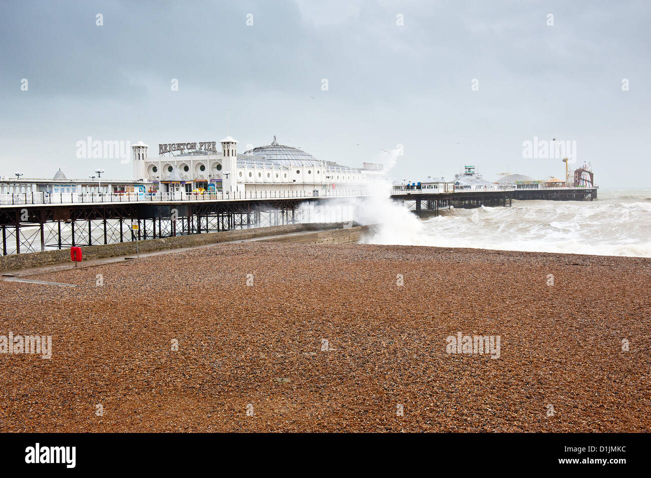 The beach by Brighton Pier is bare of festive swimmers - Specatators ...