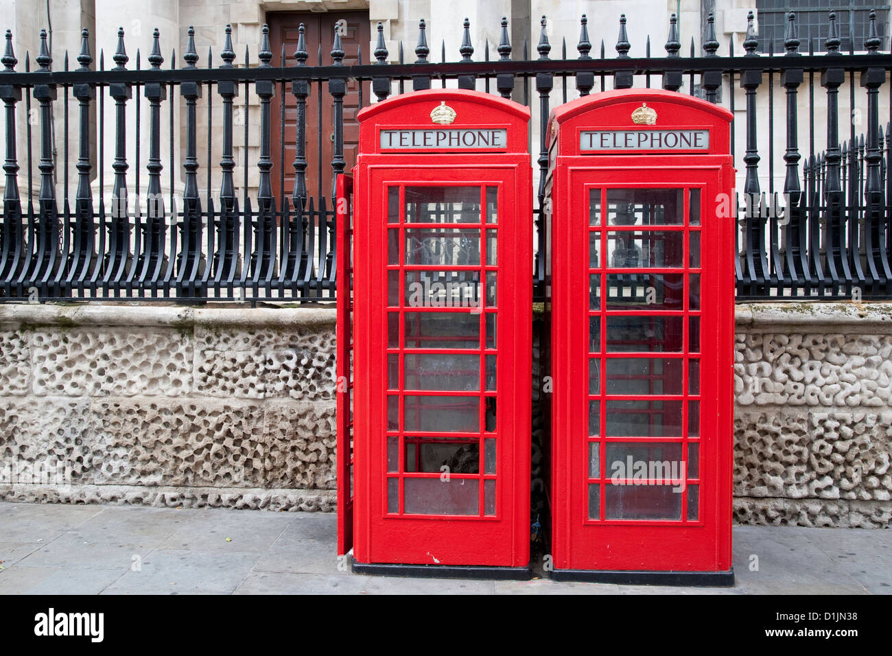 Two traditional red telephone boxes hi-res stock photography and images ...