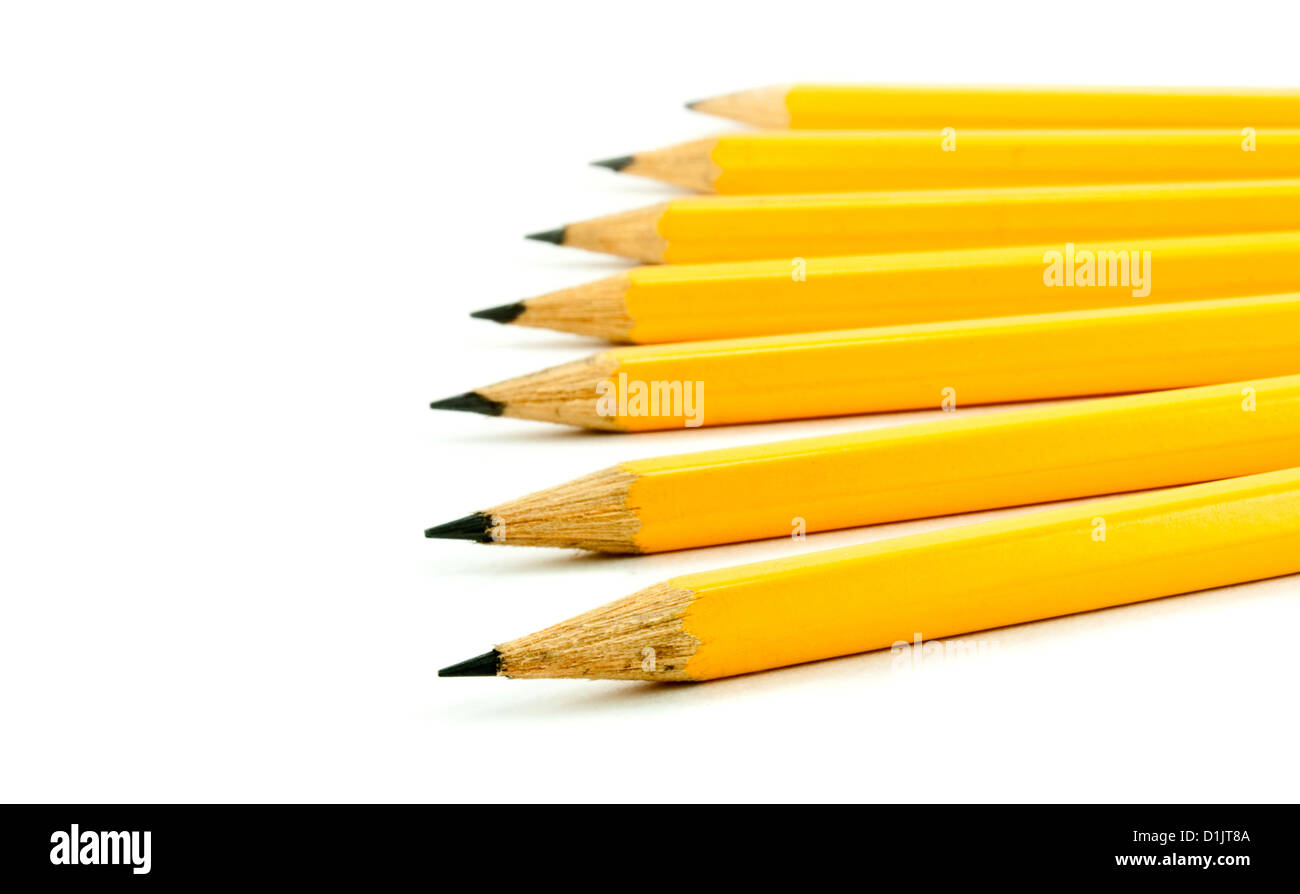 yellow pencil on a white background Stock Photo - Alamy