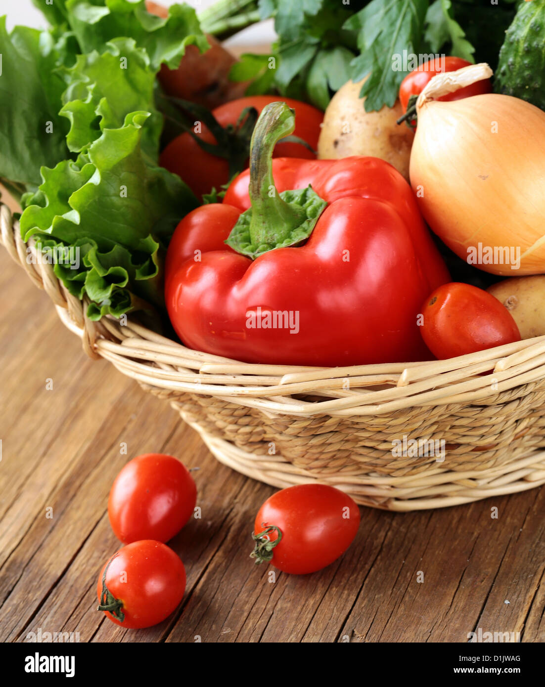 fresh vegetables and herbs mix in a wicker basket Stock Photo - Alamy