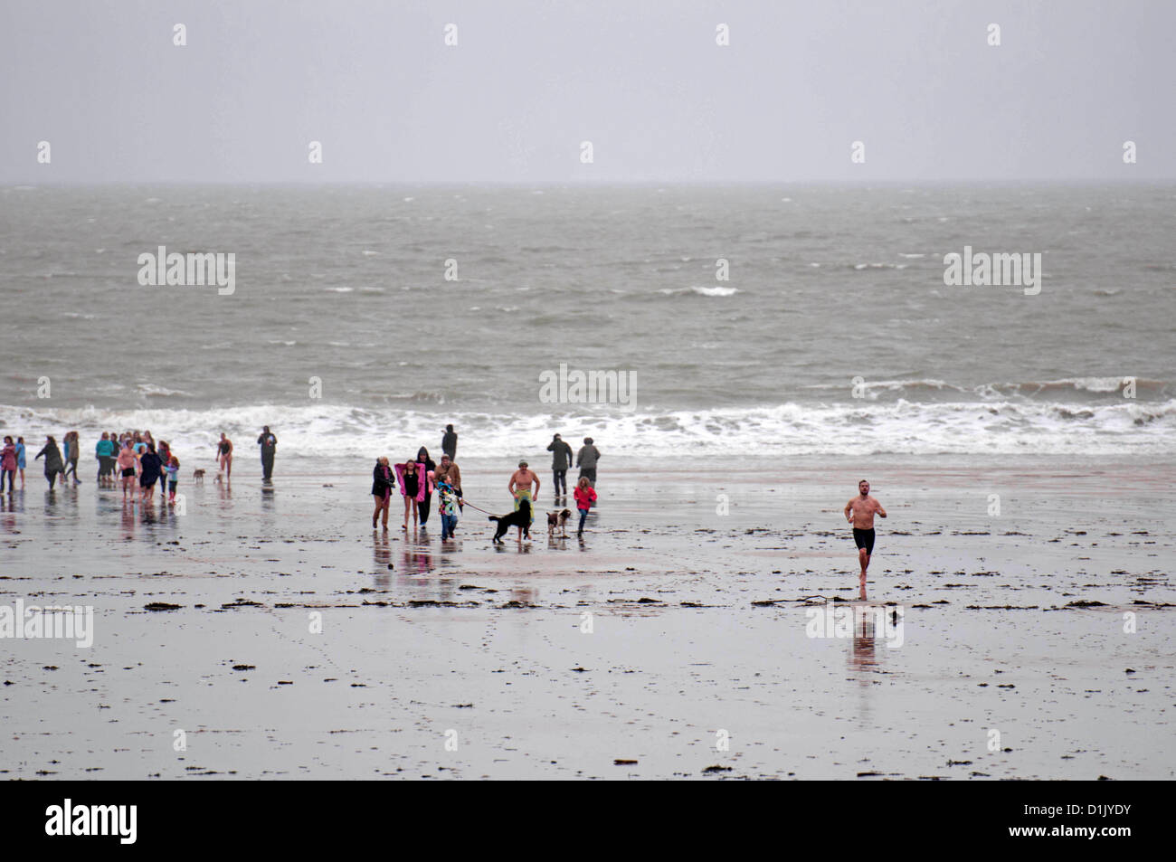 Caswell Bay, Wales, UK. 26th December 2012. Members of Mumbles ...