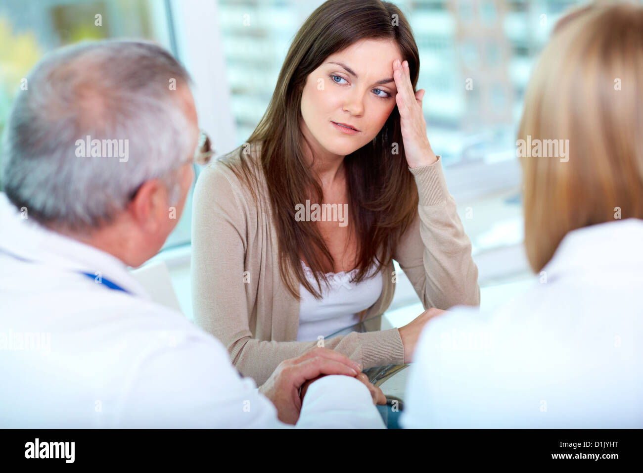 Portrait of female patient at consultation in hospital Stock Photo - Alamy