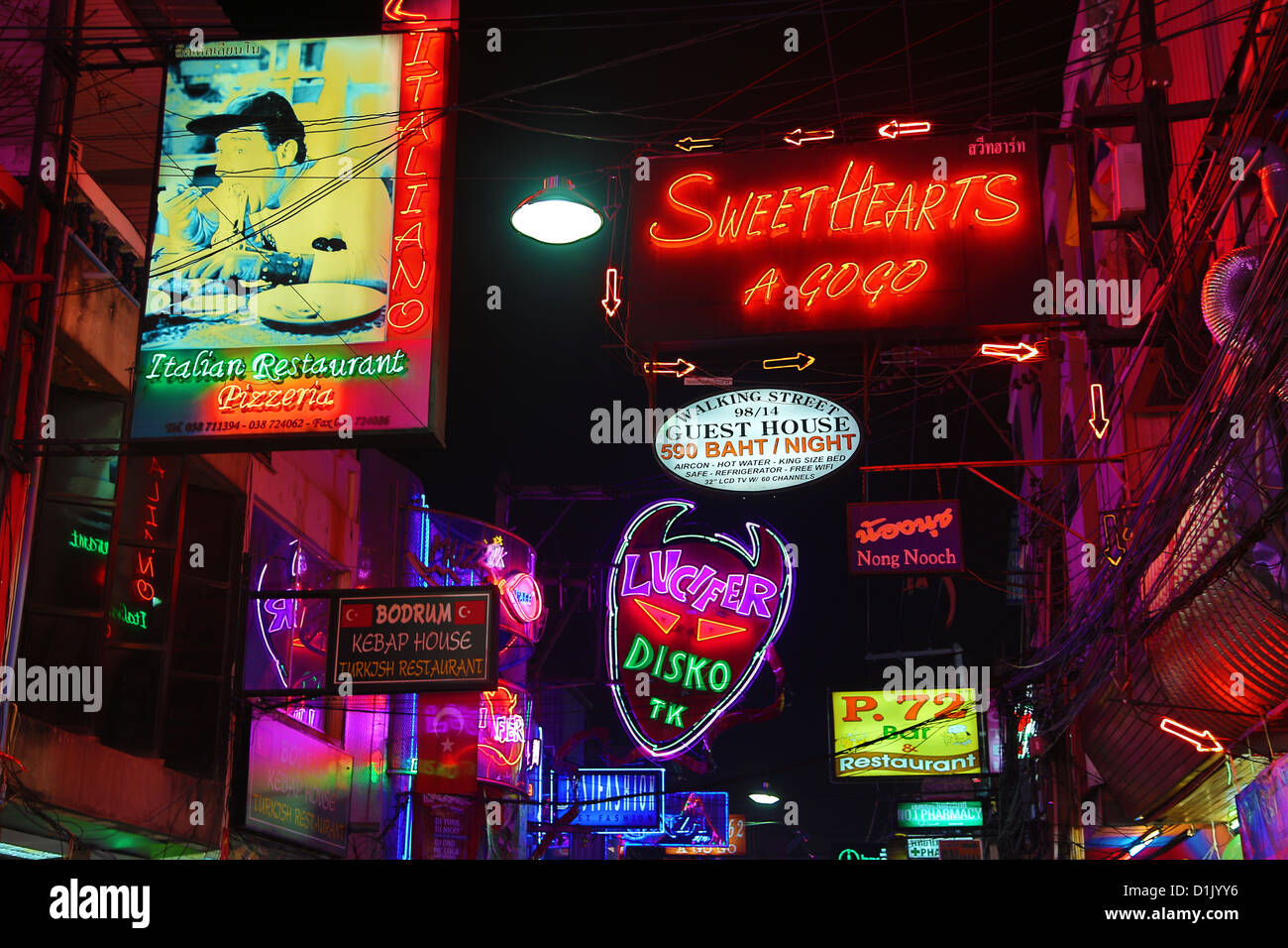 Night scene of illuminated neon signs and illuminations on Walking ...