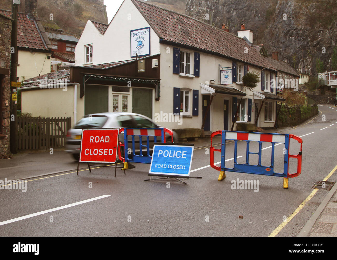 December 2012 - Cars driving past the closure signs the after effects ...