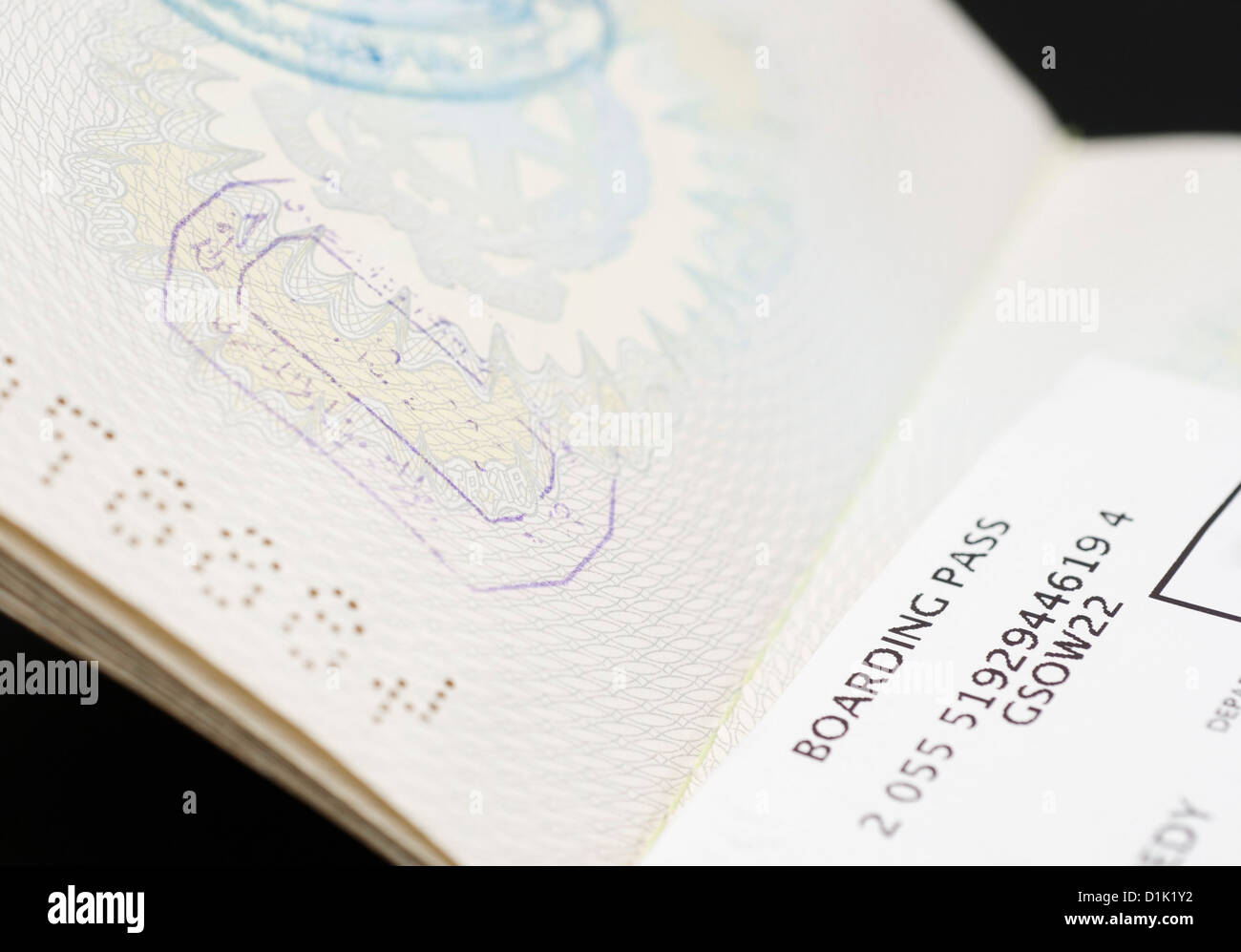 boarding pass on open passport Stock Photo - Alamy