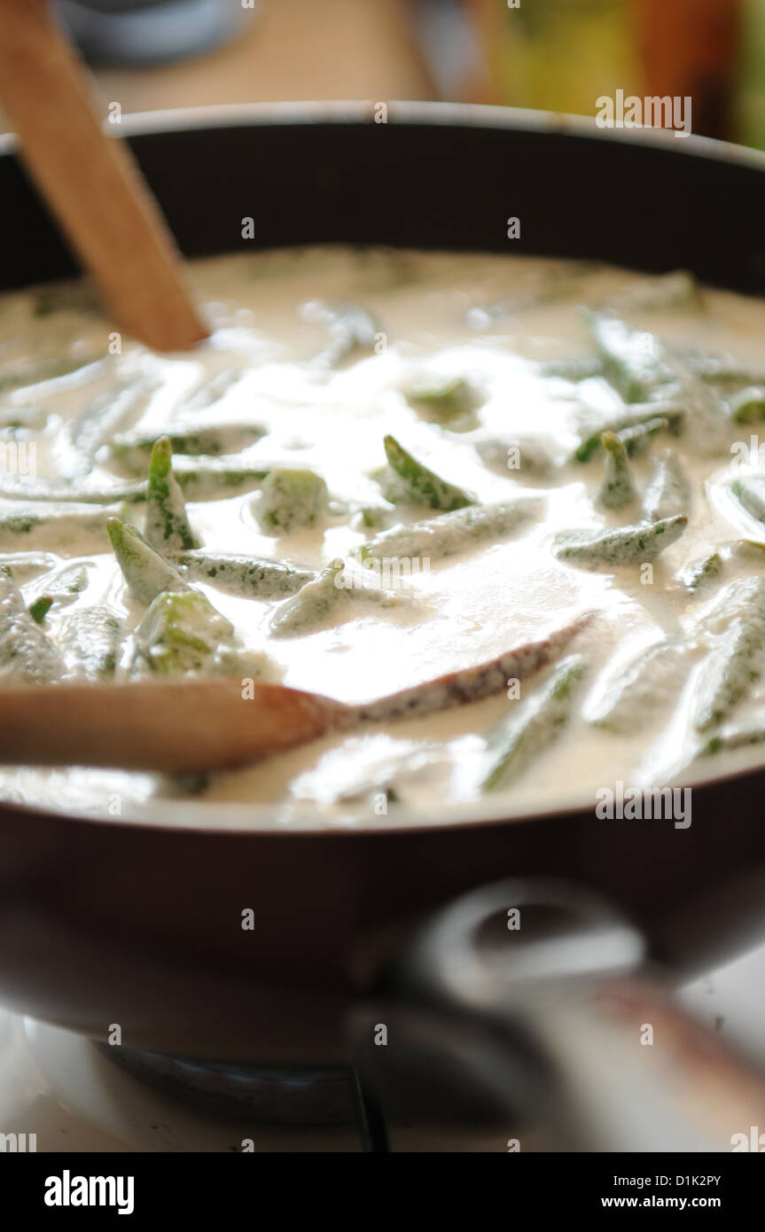 Cooking Okra in Cream sauce Stock Photo - Alamy