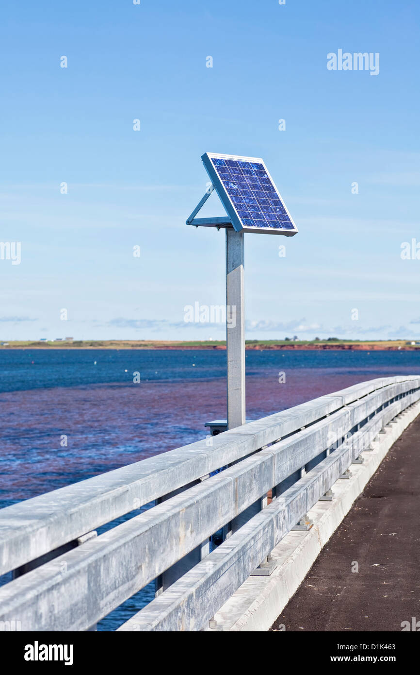 Small solar panel on the side of a bridge Stock Photo - Alamy