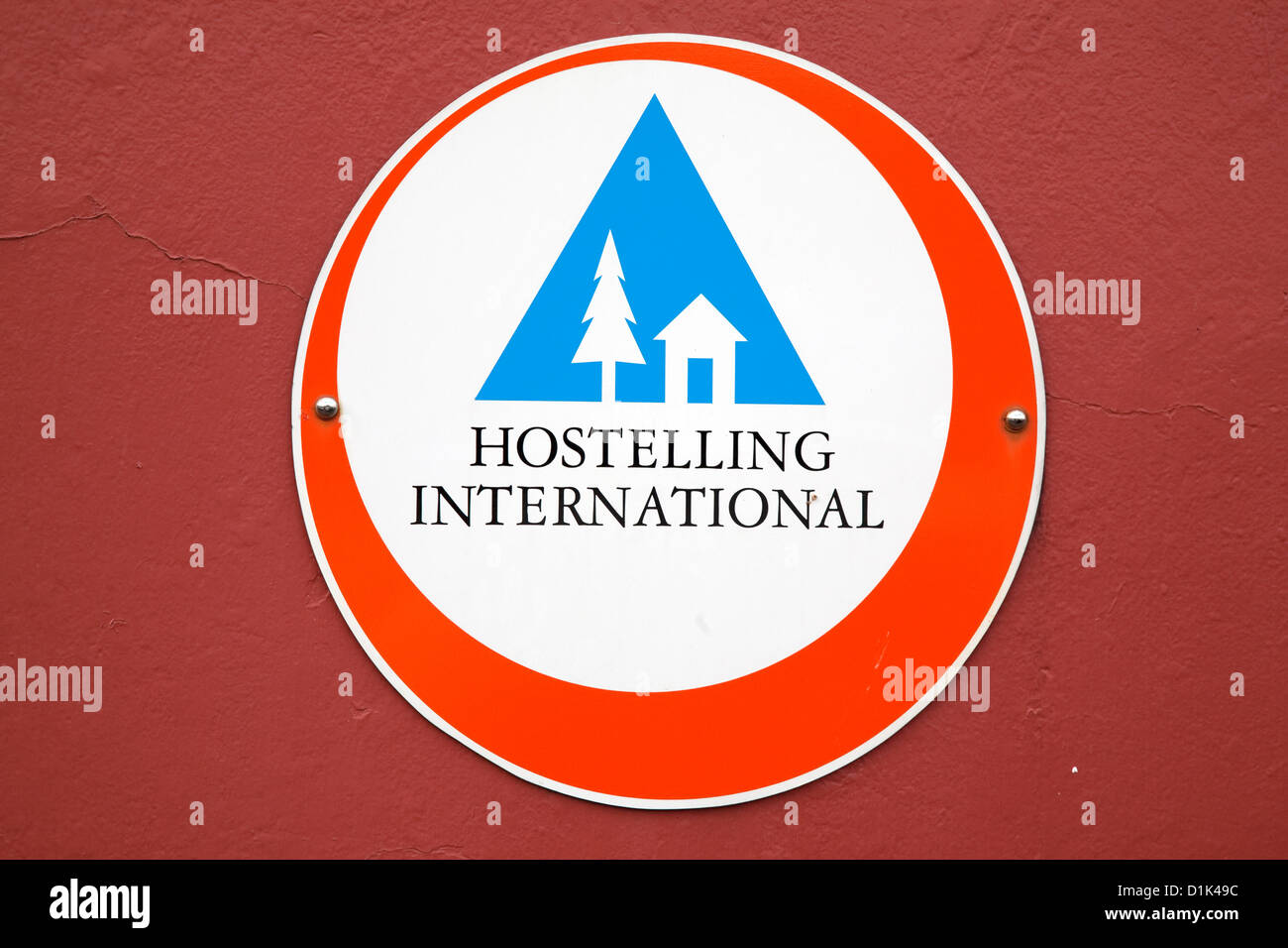 Hostelling Internation Sign on Red Wall Stock Photo - Alamy
