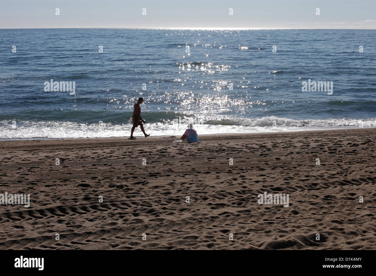 Empty Marbella beach in winter Stock Photo - Alamy