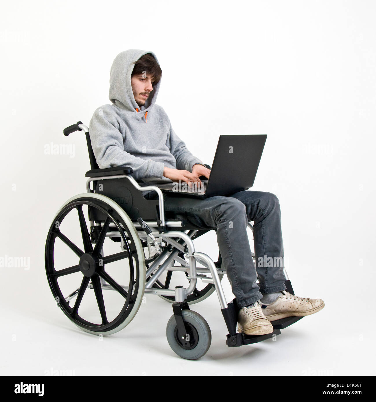 Disabled with computer Stock Photo - Alamy