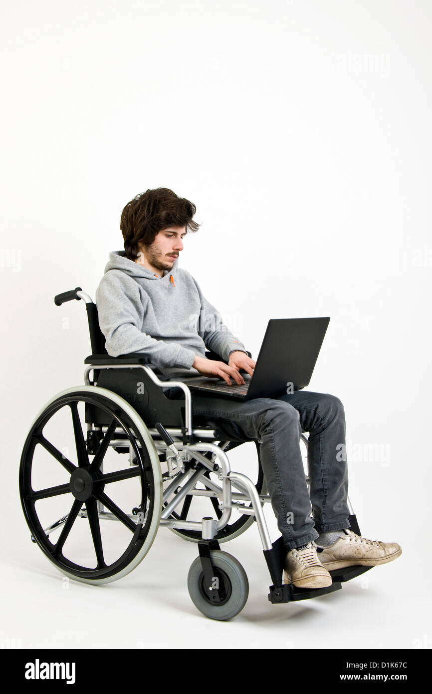 Disabled with computer Stock Photo - Alamy