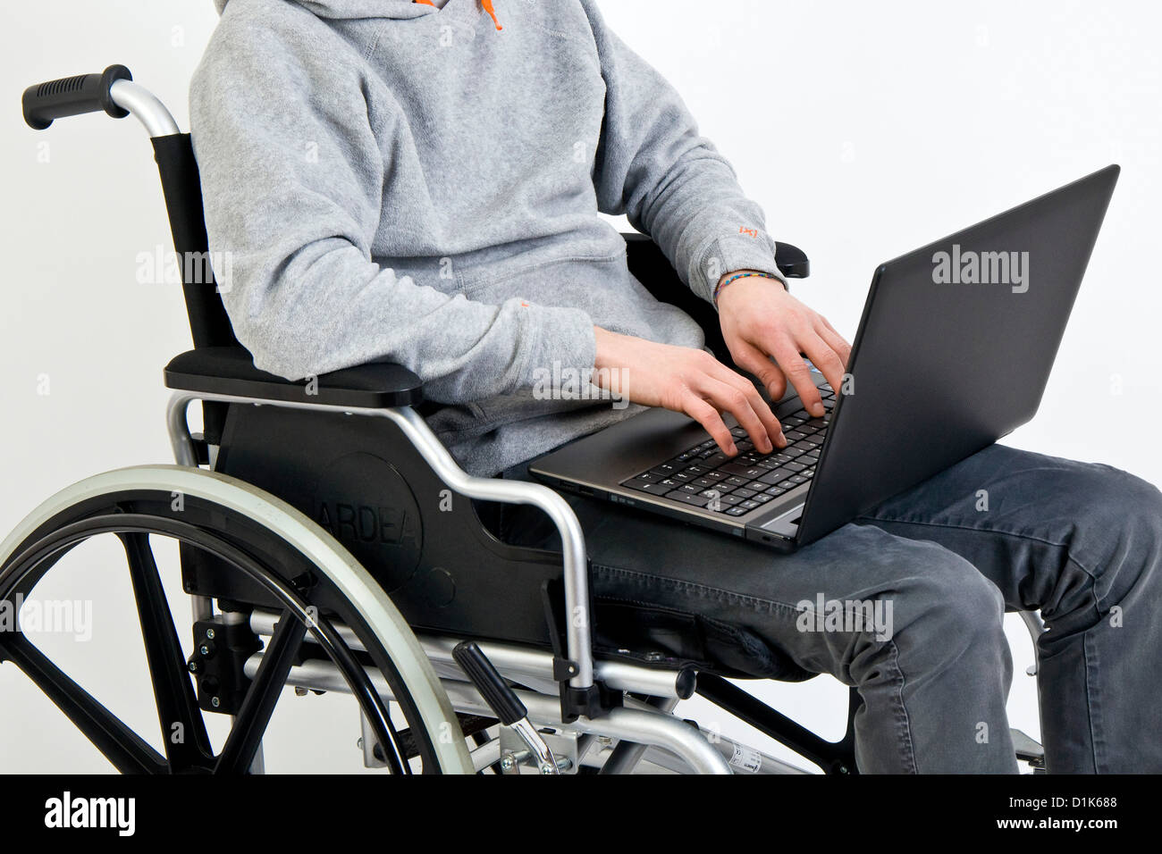 Disabled with computer Stock Photo - Alamy
