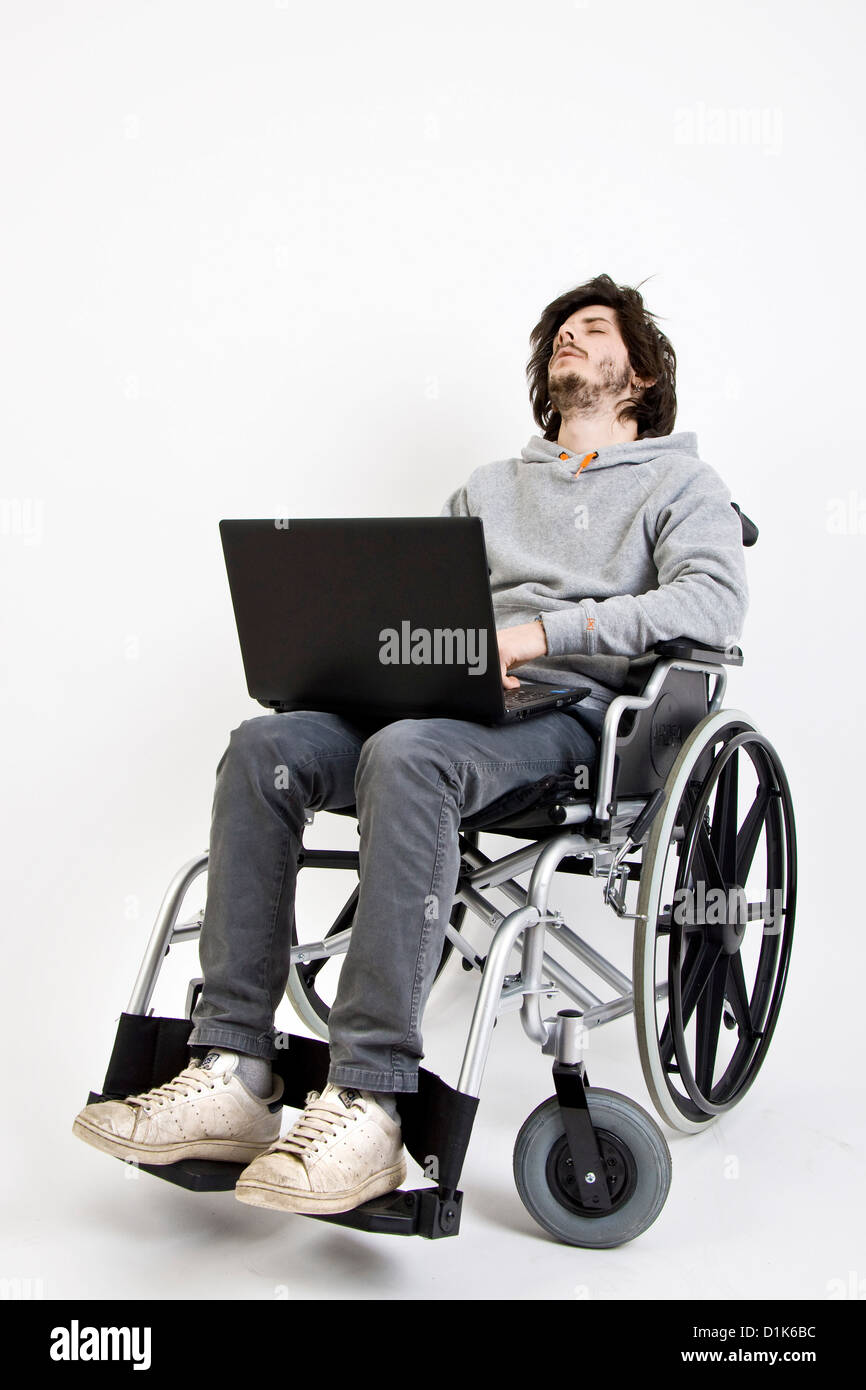Disabled with computer Stock Photo - Alamy