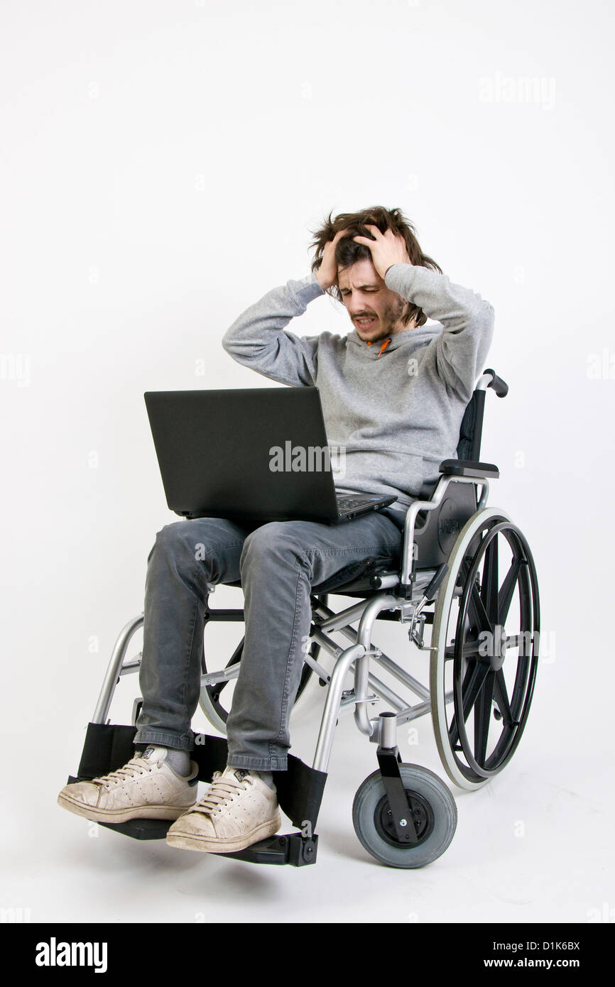 Disabled with computer Stock Photo - Alamy