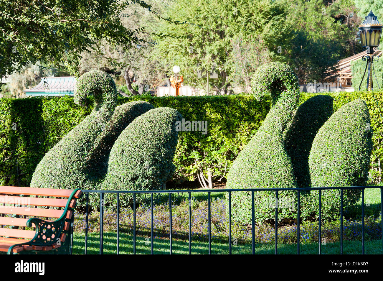 Bush in the shape of animal Stock Photo - Alamy