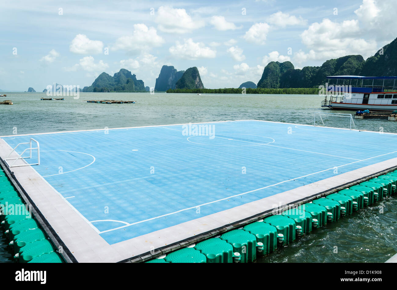 Floating soccer field at Ko Panyi Muslim stilt village with limestone ...