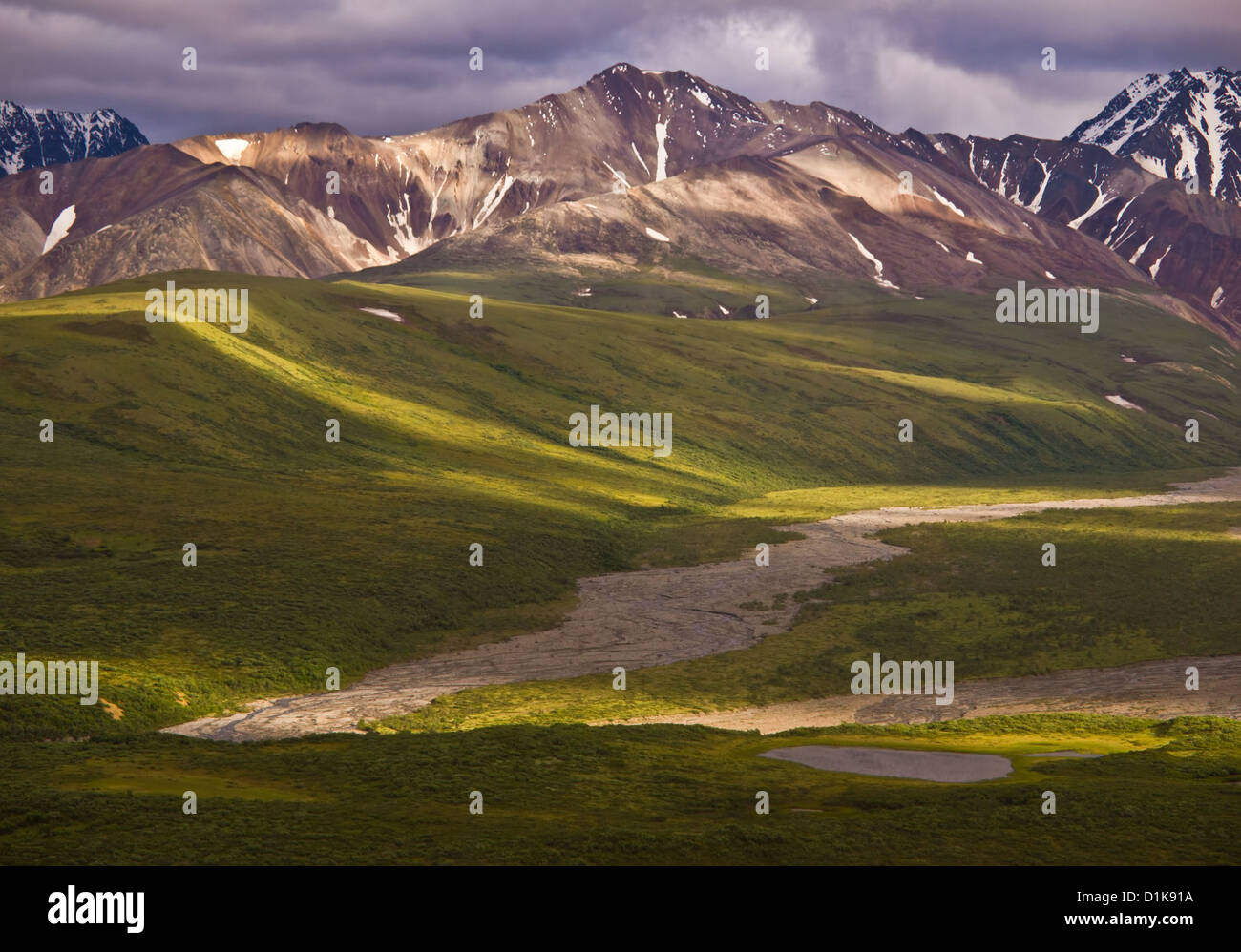 Sun shade streaks green mountains hi-res stock photography and images ...