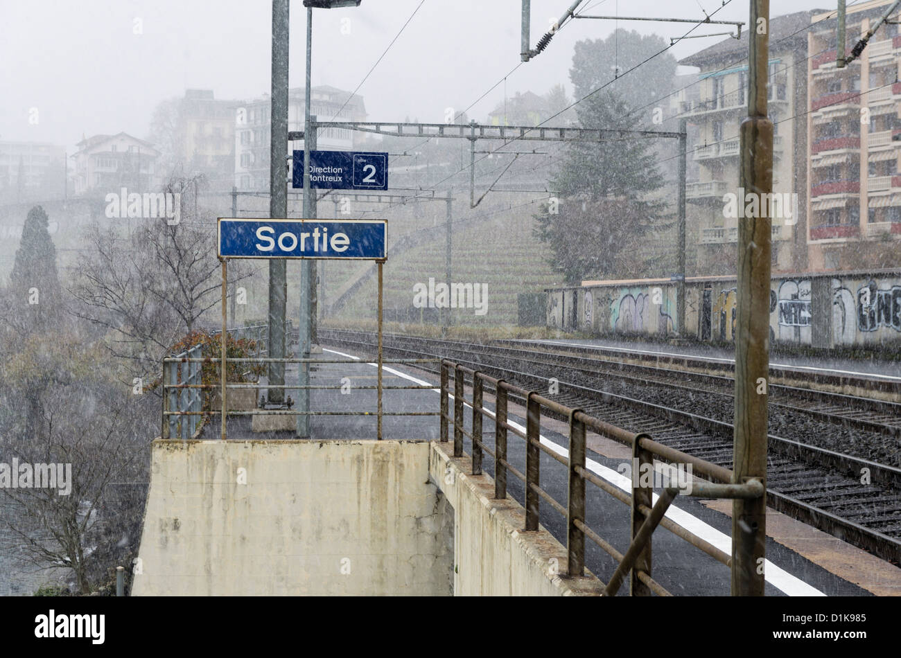 Exit (Sortie) sign and train tracks at Montreux Veytaux Chillon train ...