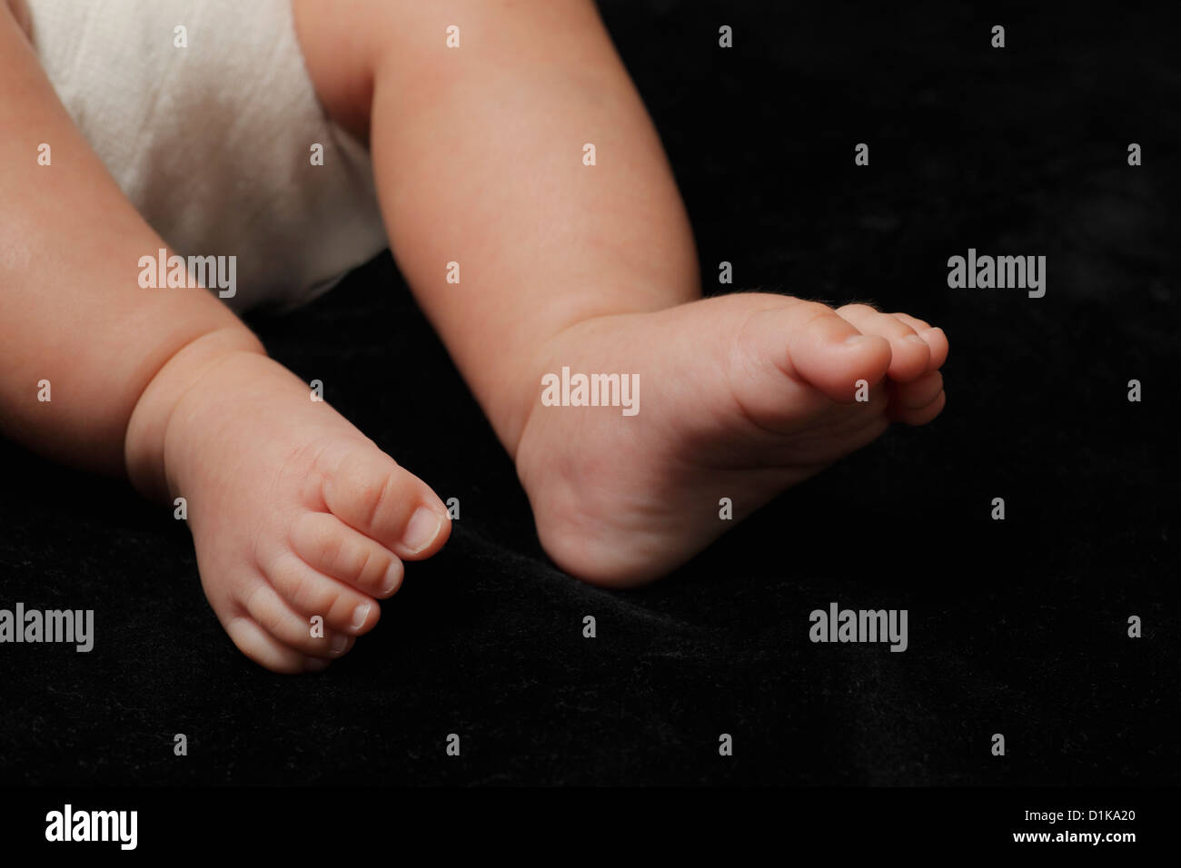 Close up of little baby's feet Stock Photo - Alamy