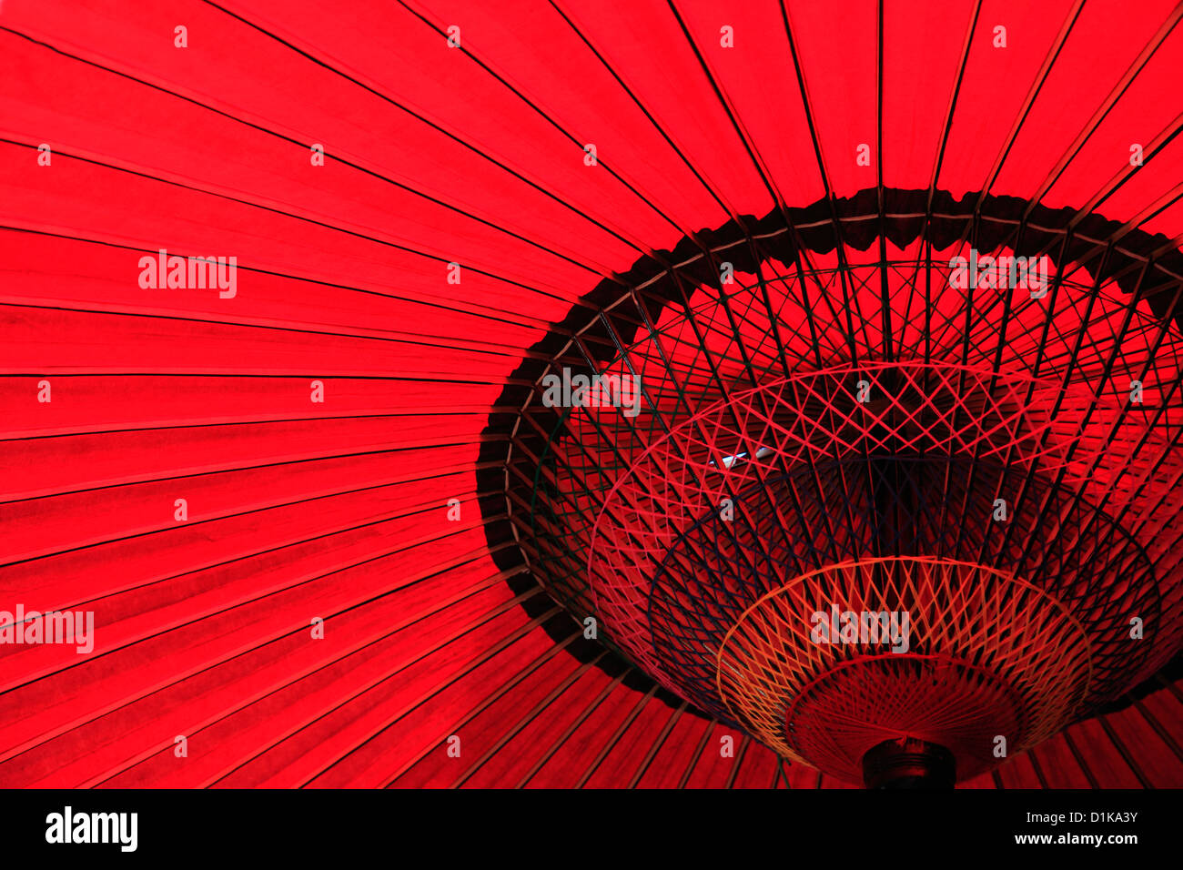 Close up shot of hand made red umbrella Stock Photo - Alamy