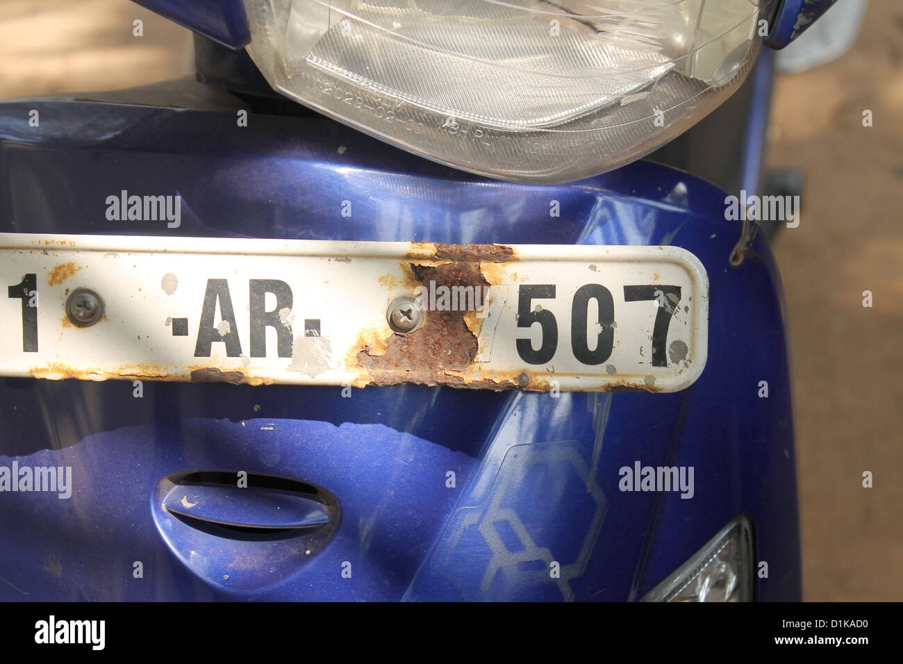 A rusted number plate of a two-wheeler Stock Photo - Alamy