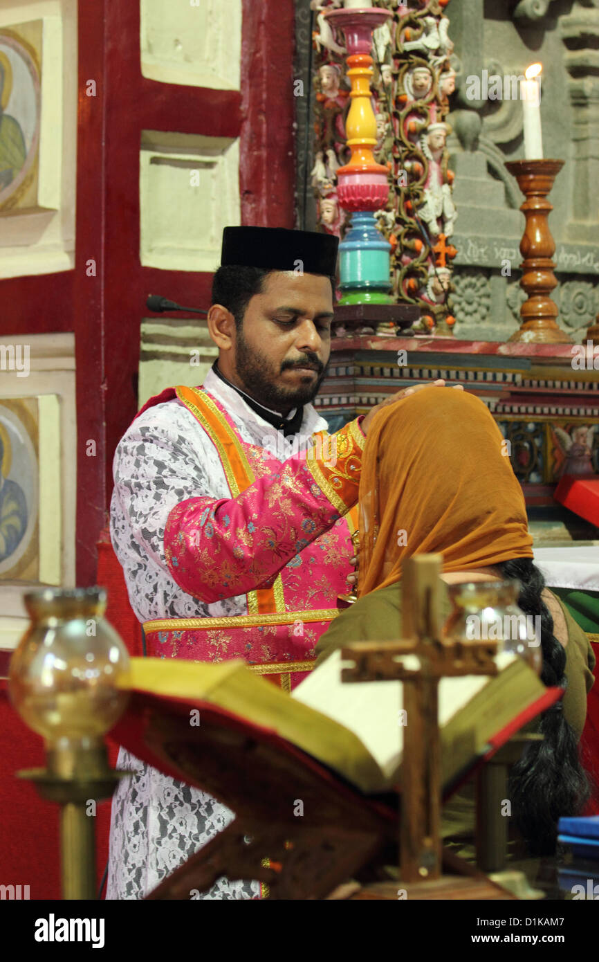 Father blessing a devotee in the church Stock Photo - Alamy