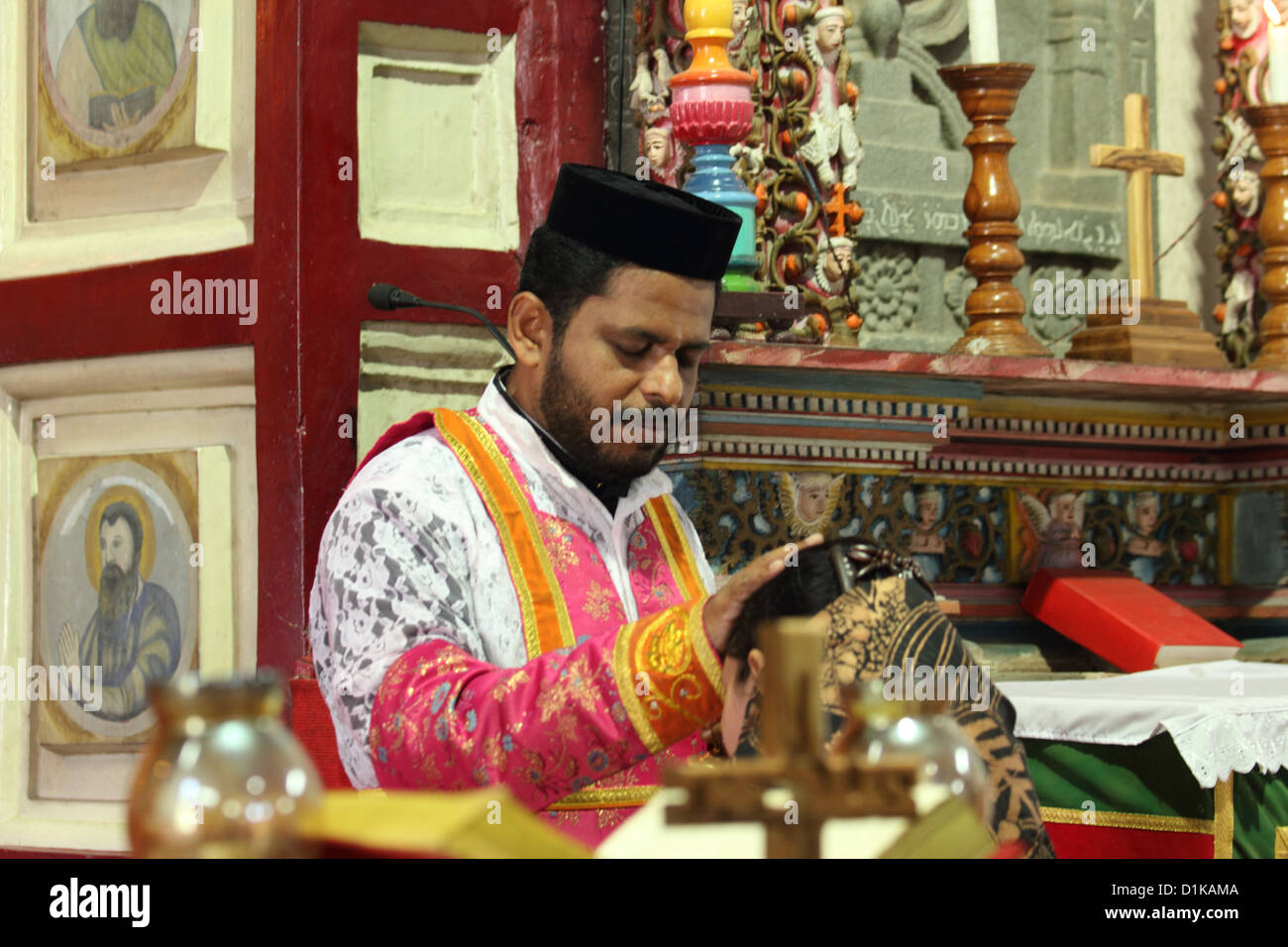 Father Blessing a devotee in the church Stock Photo - Alamy