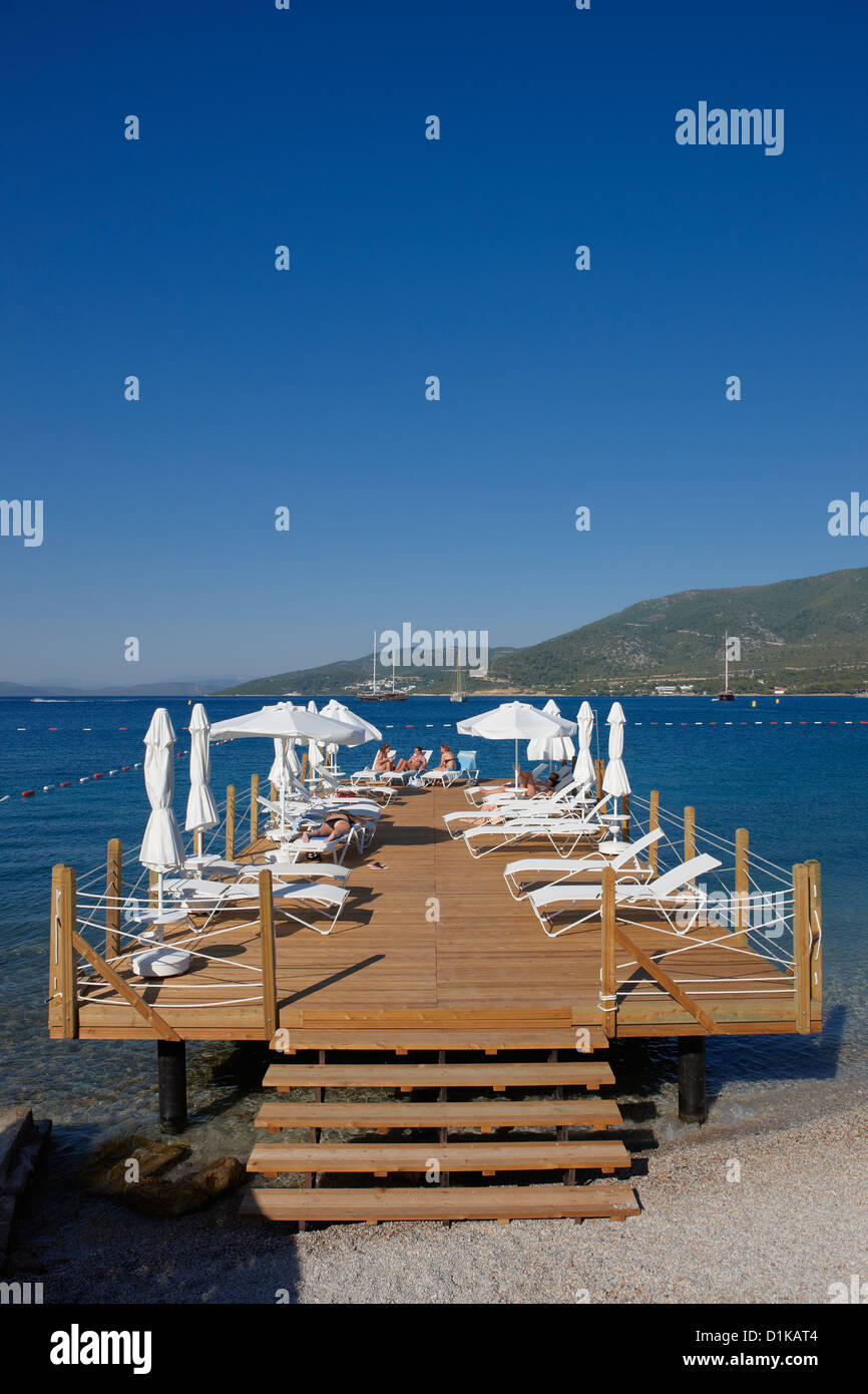 Overwater beach platform for sunbathing and swimming. Torba village ...