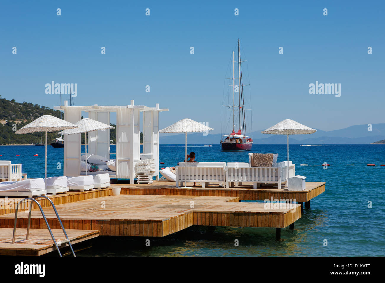 Overwater beach platform for sunbathing and swimming. Torba village ...
