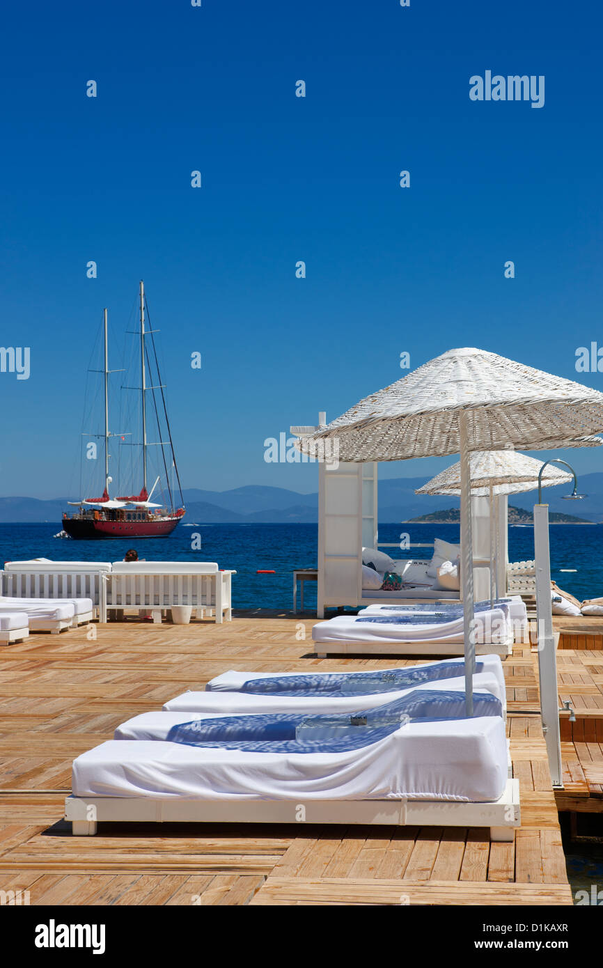 Overwater beach platform for sunbathing and swimming. Torba village ...