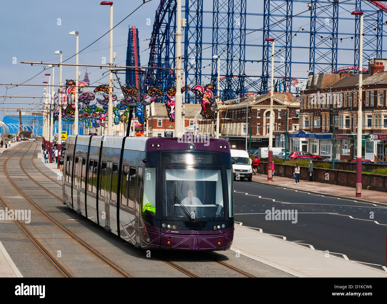 Modern tram on Blackpool promenade in front of the Pleasure Beach Stock ...